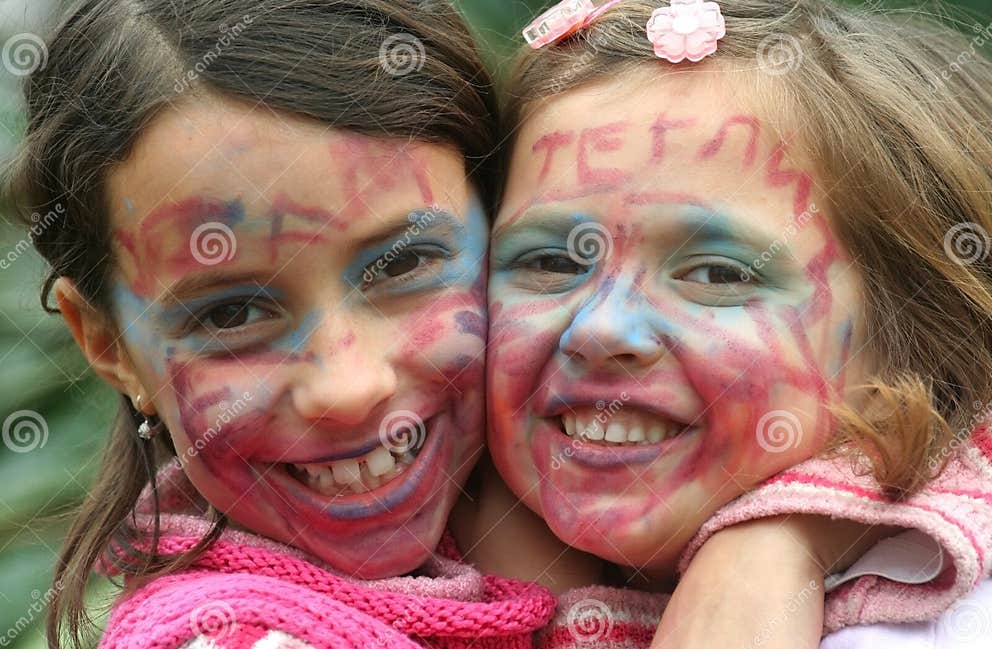 Caras pintadas foto de archivo. Imagen de joven, color - 6317716
