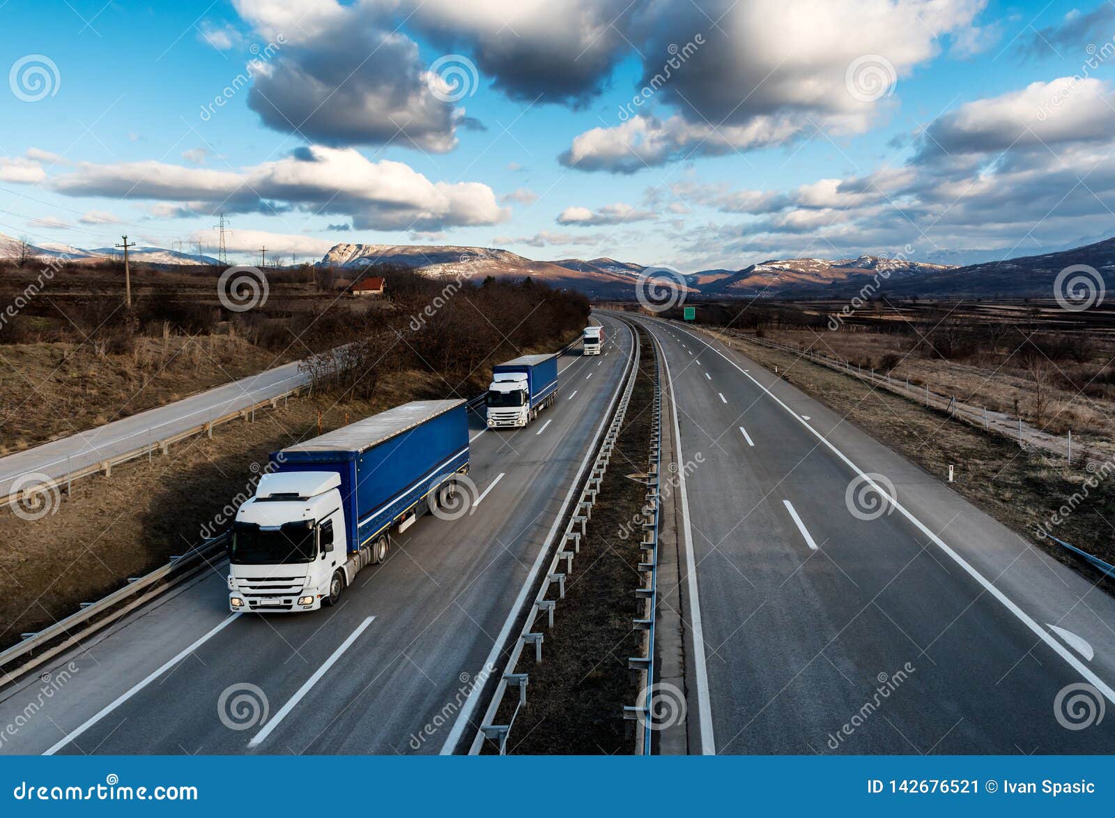 Caravan or Convoy of Lorry Trucks on Country Highway Stock Image ...