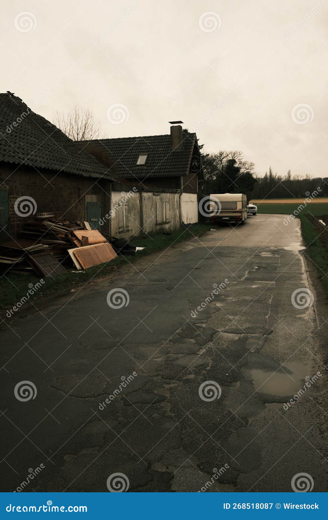 Caravan in Front of Run-down House on a Side Road Near Meerbusch ...
