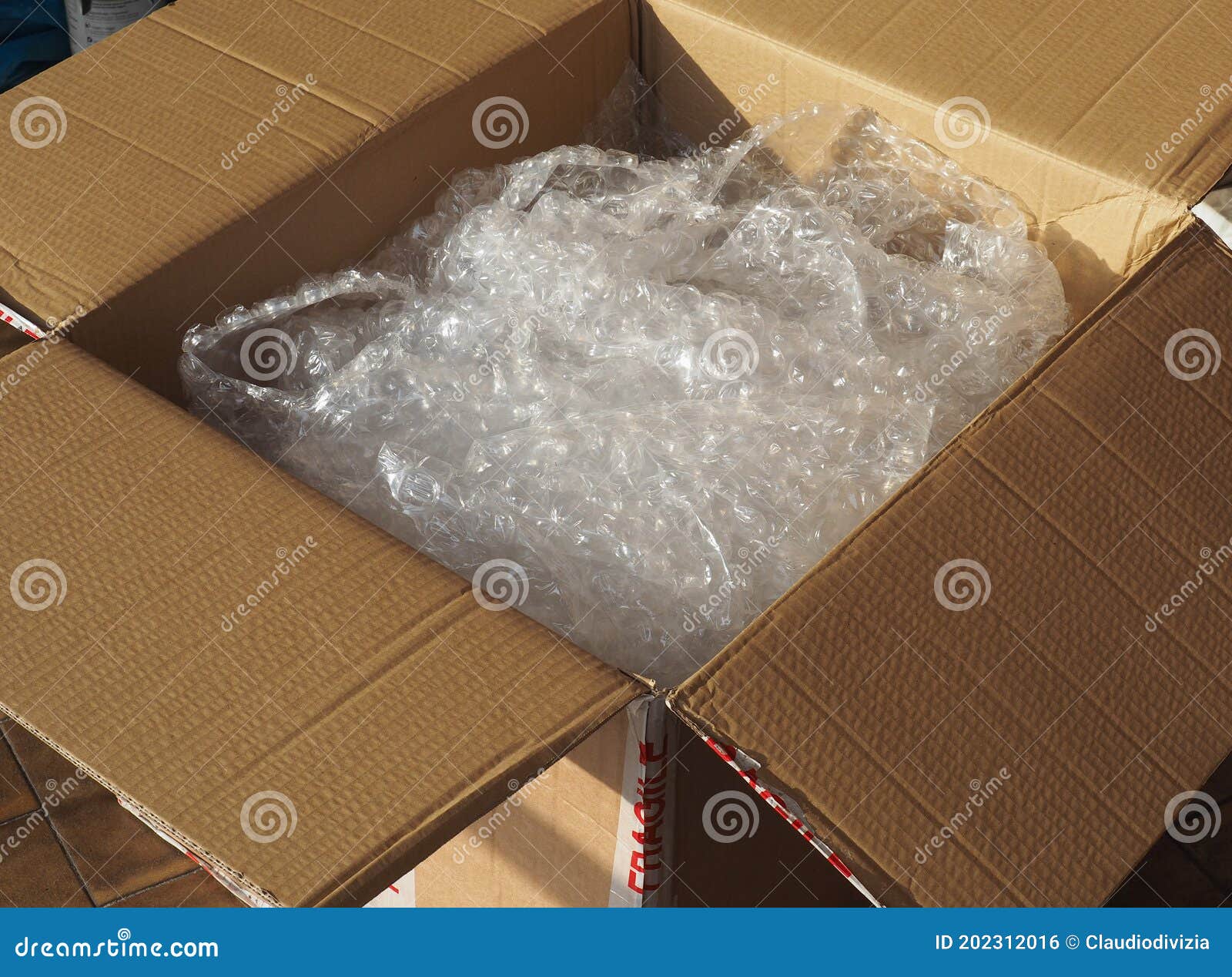 Carboard Box with Bubble Wrap Stock Photo - Image of wrap, transit ...