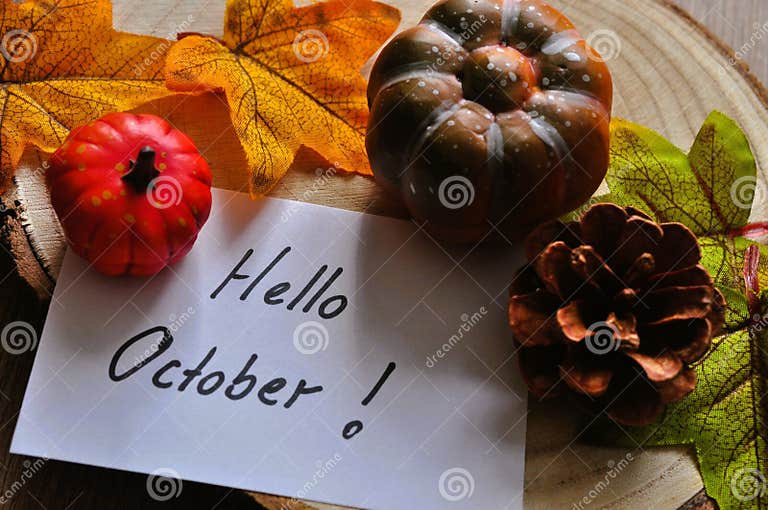Card with Hello October Write between Leaves and Pumpkins Stock Photo ...