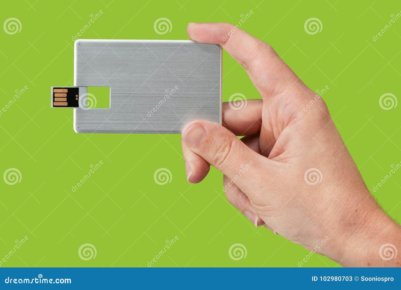 Card USB Flash Memory on Hand with Isolated Green Background Stock ...