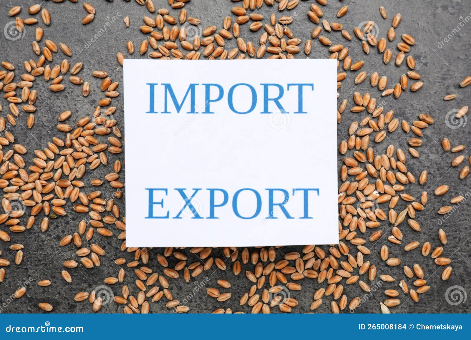Card with Words Import and Export and Wheat Grains on Grey Table, Flat ...
