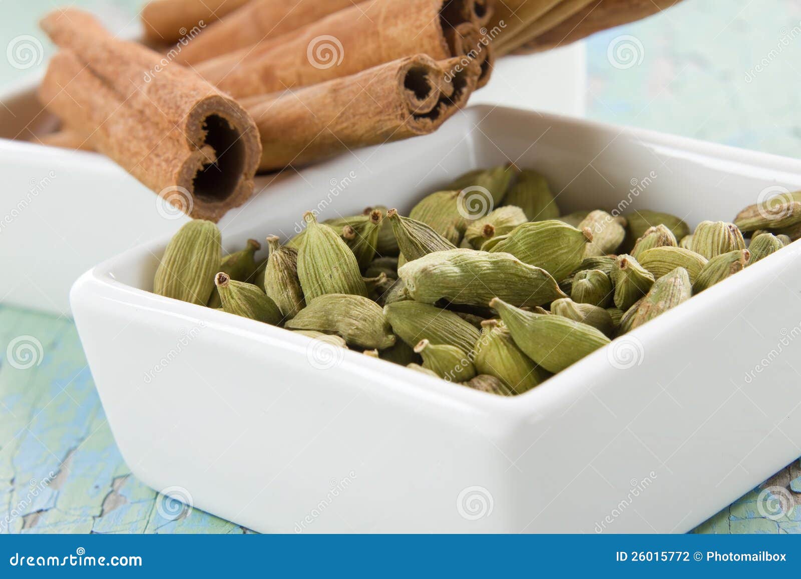 Cardamom and cinnamon stock photo. Image of fragrance - 26015772