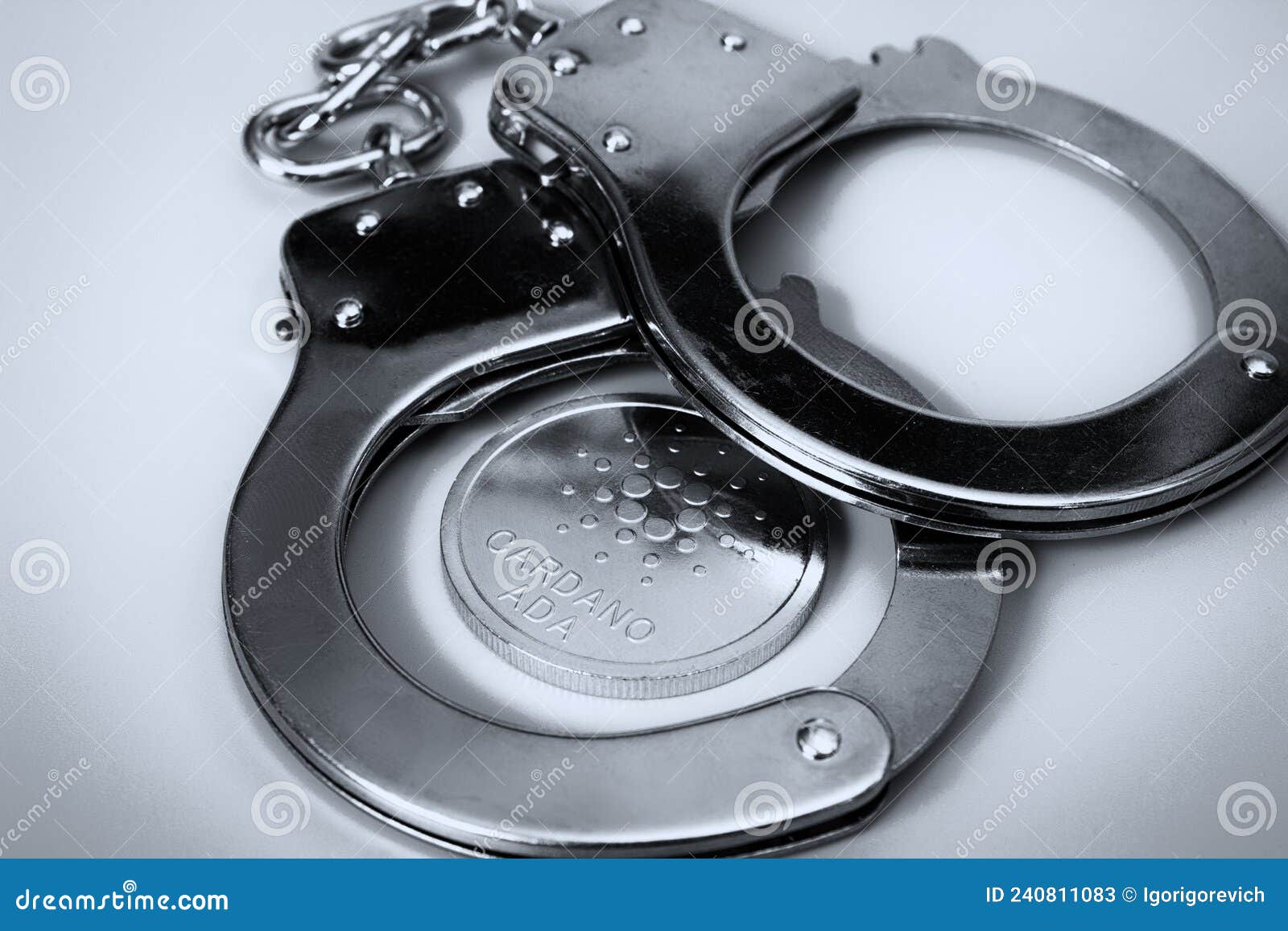 Cardano coin and handcuffs stock image. Image of arrest - 240811083