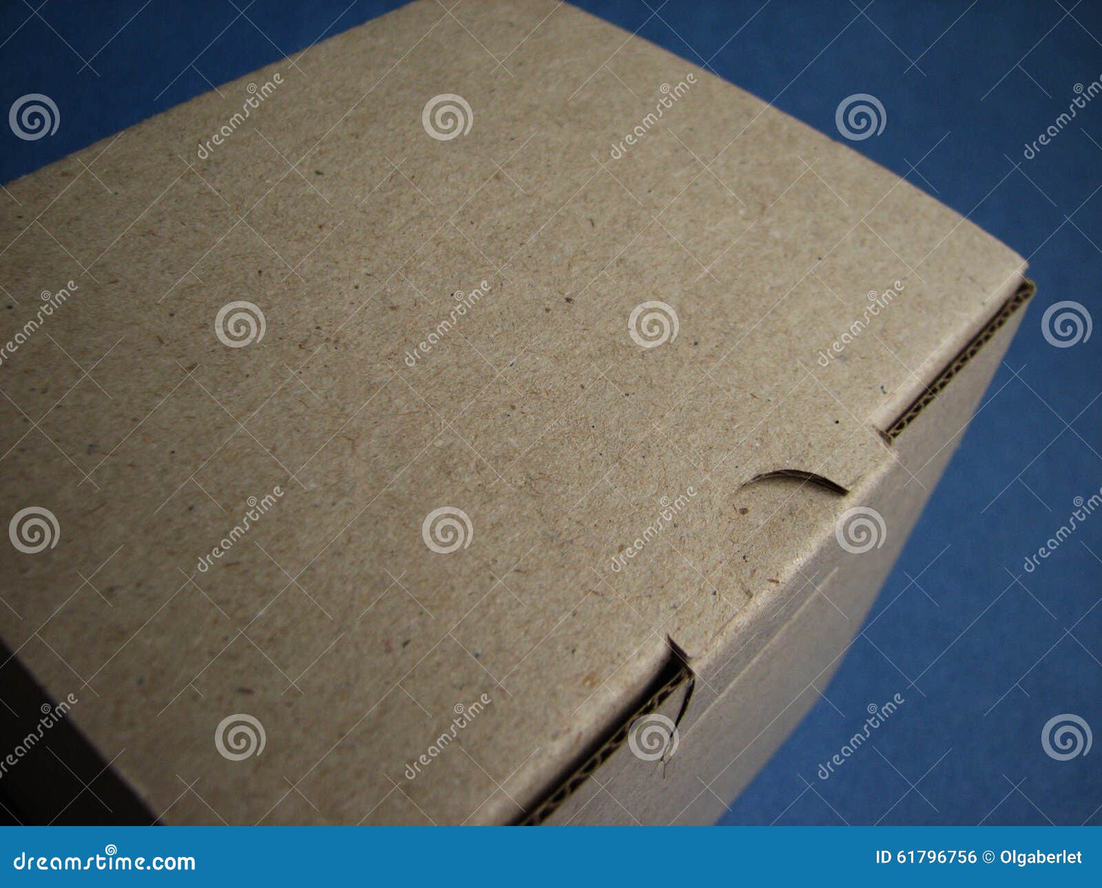 Cardboard Box on a Dark Blue Background Stock Photo - Image of kraft ...