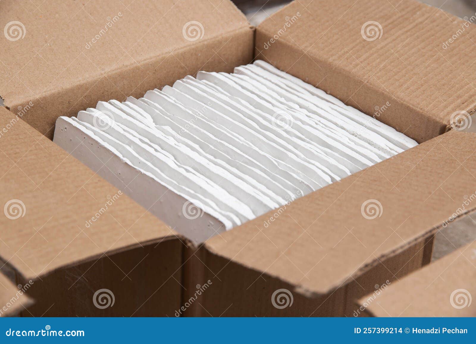 Cardboard Box with a Decorative Stone Made of Plaster in the Form of a ...