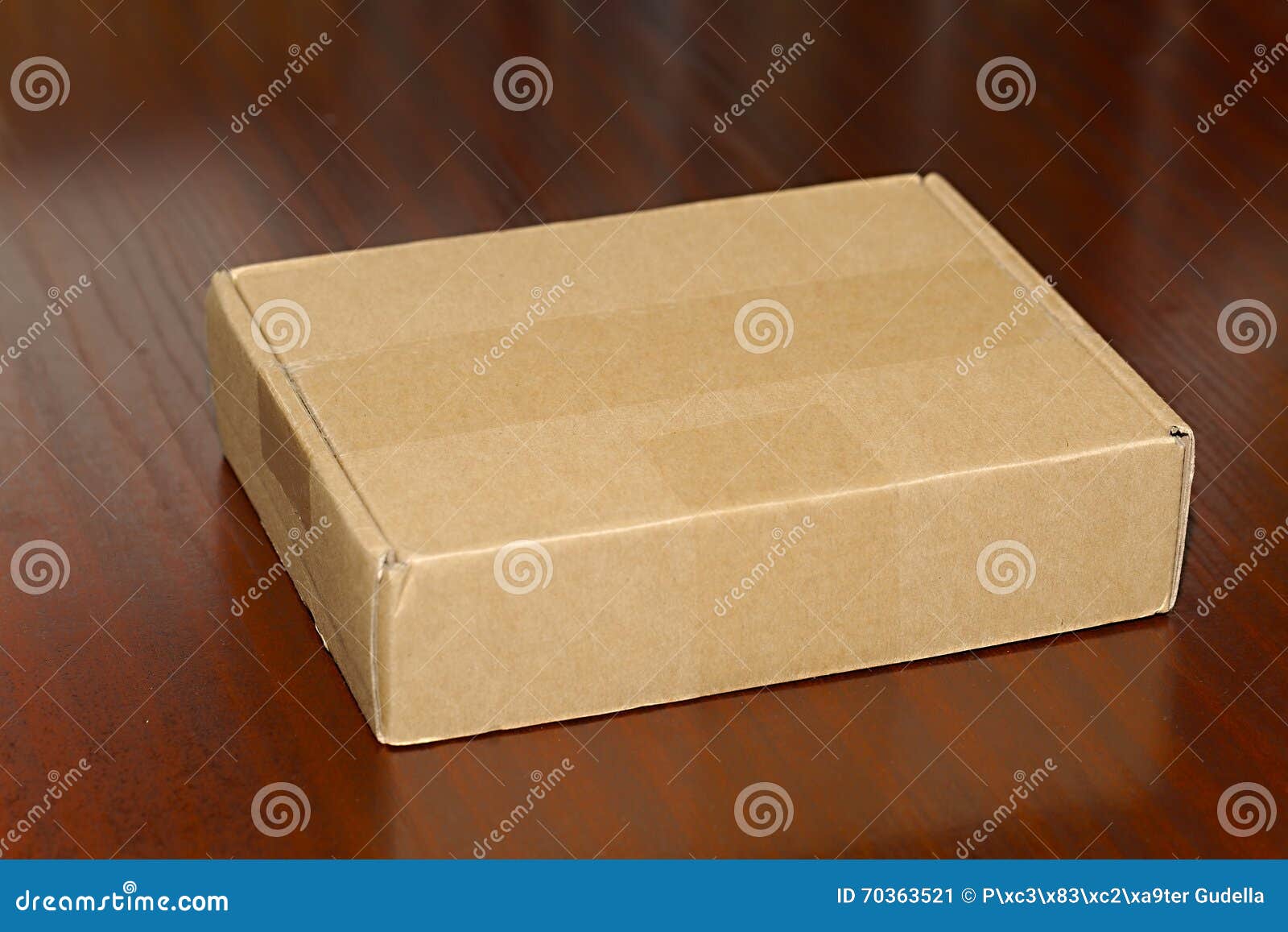 Cardboard Box on Desk stock image. Image of postal, post - 70363521