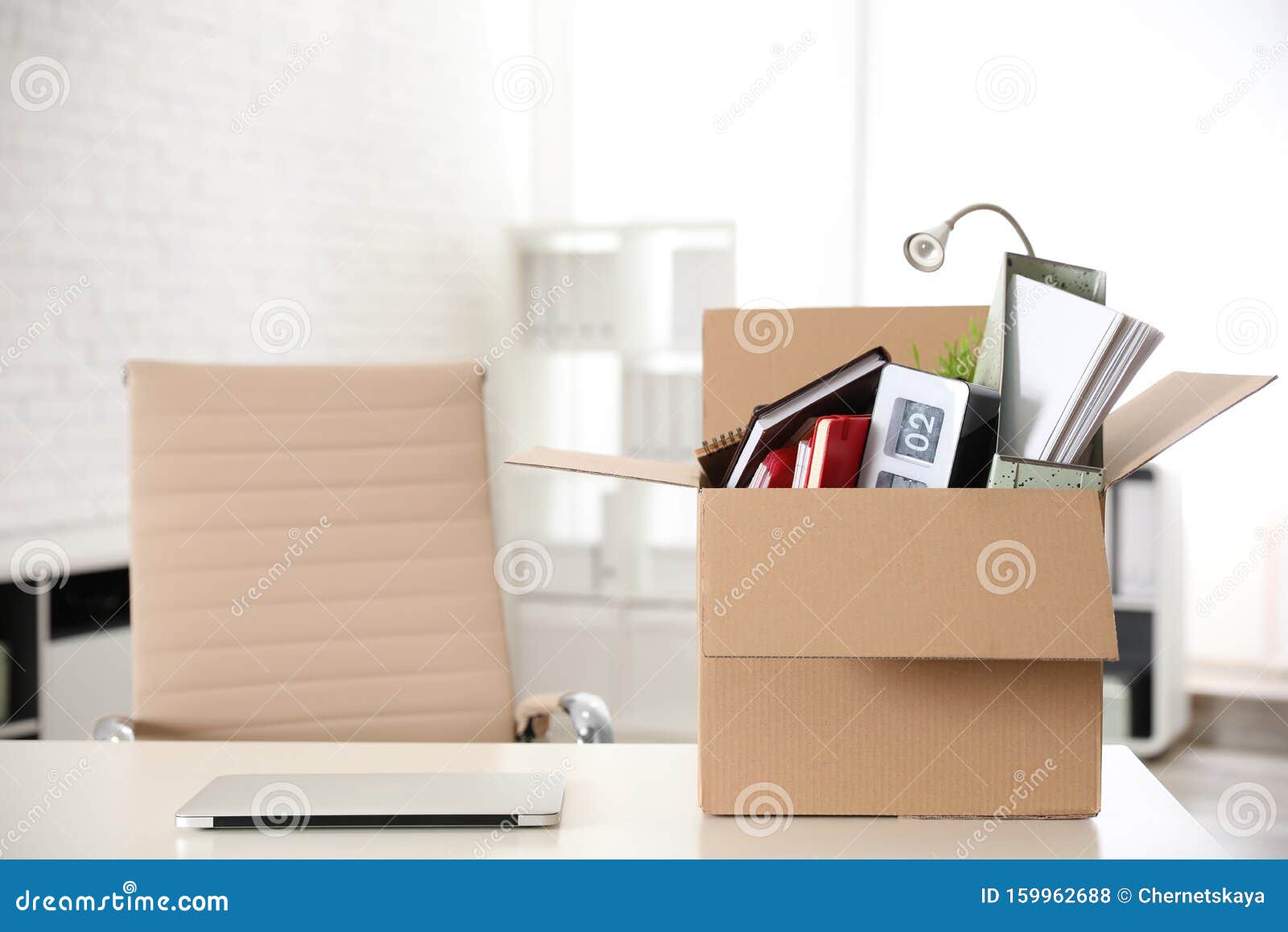 Cardboard Box Full of Stuff on Table Stock Photo - Image of concept ...