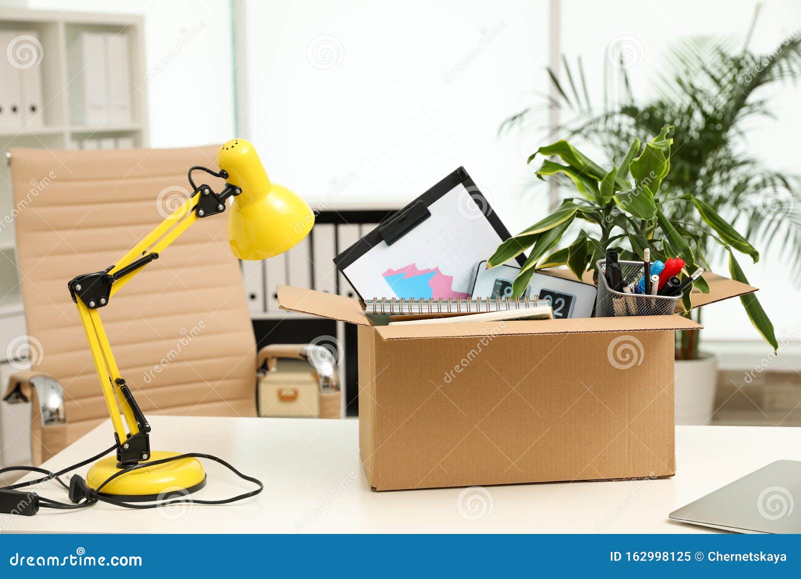 Cardboard Box Full of Stuff on Table Stock Image - Image of fired, pile ...