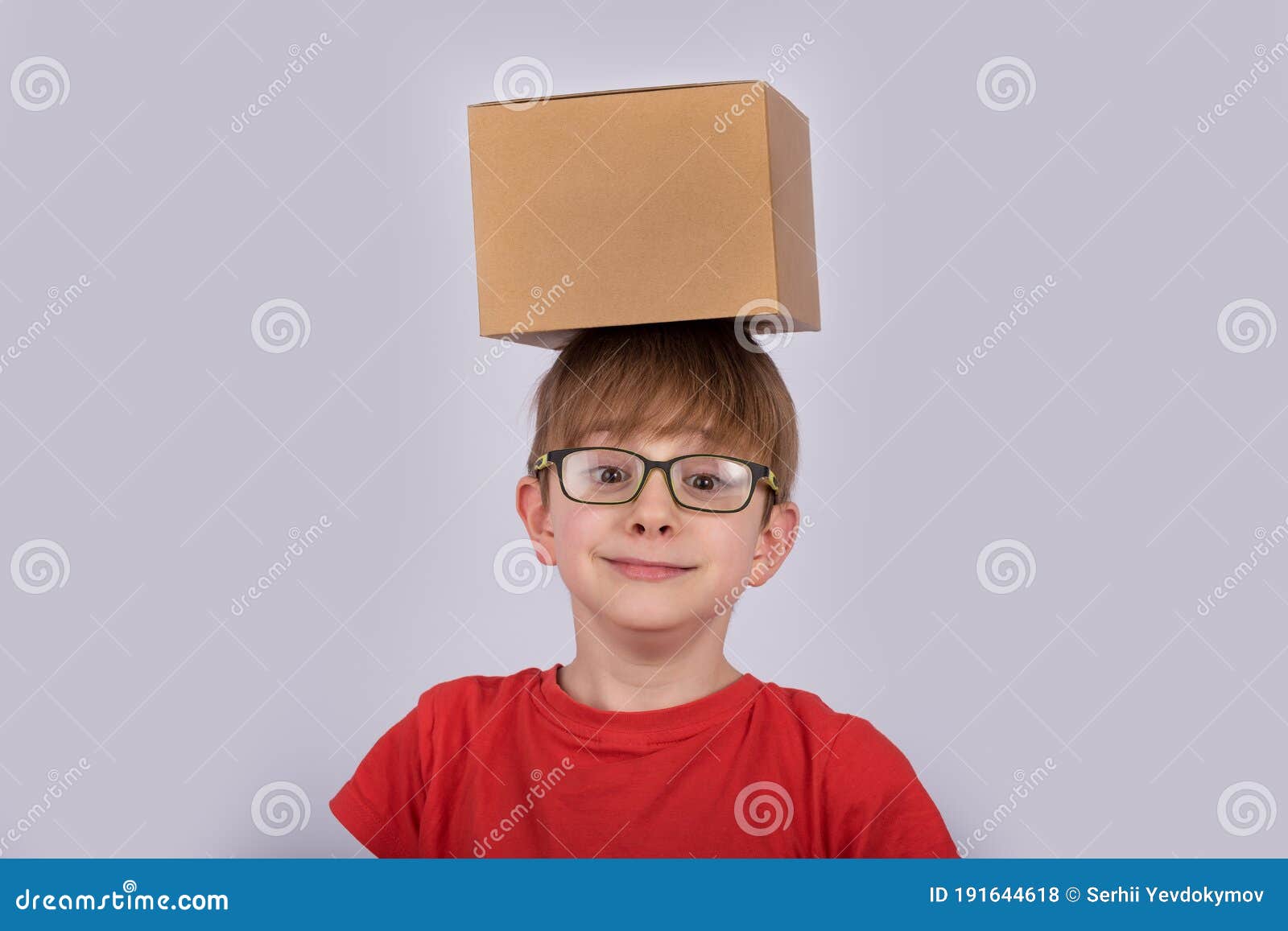 Cardboard Box on Head of Boy. Child Holding Box on His Head Stock Photo ...