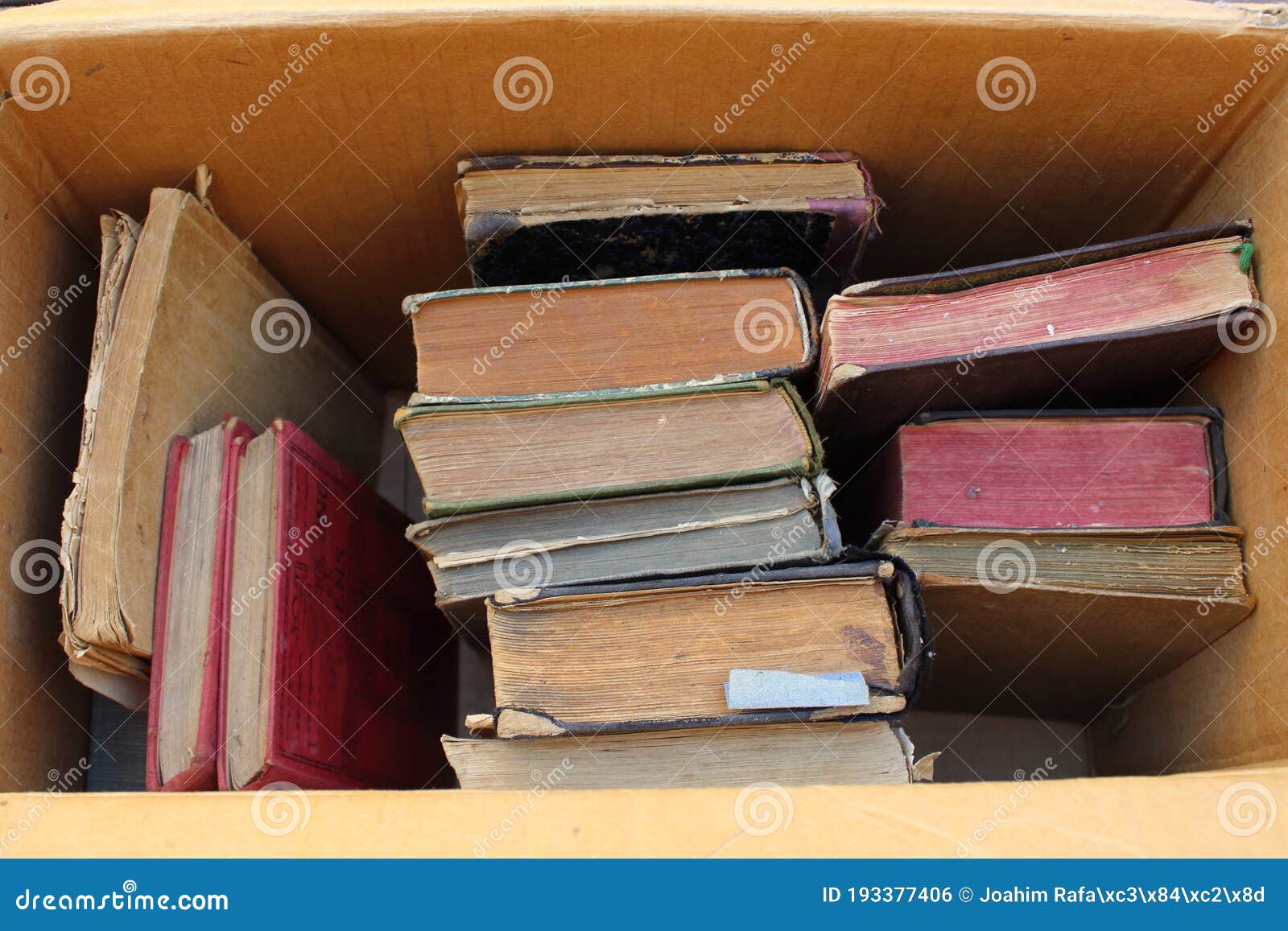 Cardboard Box with Old Books on the Table Close-up Stock Photo - Image ...