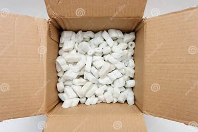 A Cardboard Box with Packing Foam Pellets Stock Photo - Image of cross ...