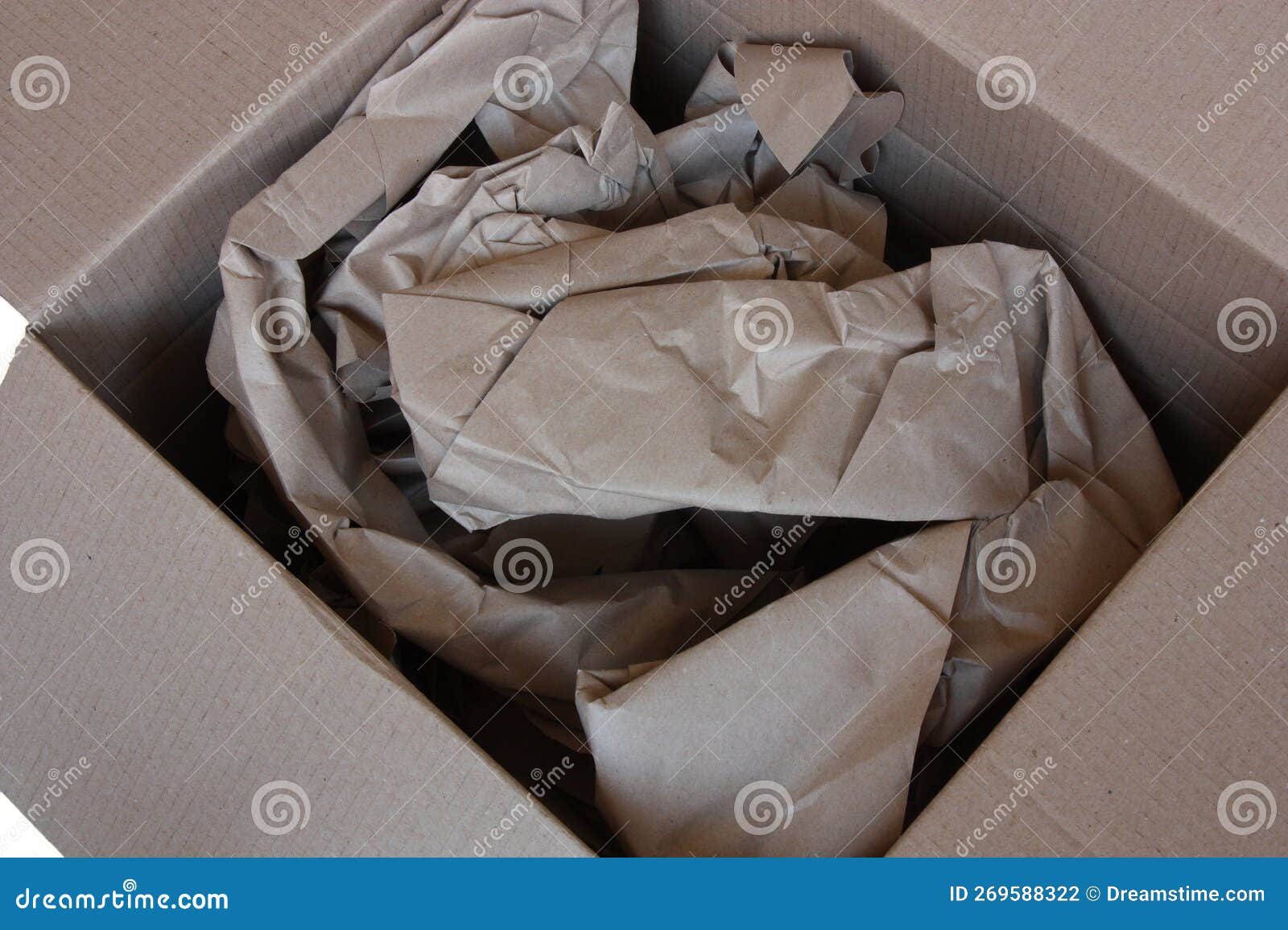 Cardboard box with paper stock photo. Image of isolated - 269588322