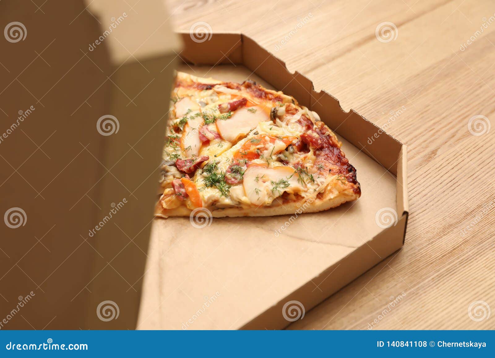 Cardboard Box with Pizza Pieces on Wooden Table. Stock Photo - Image of ...