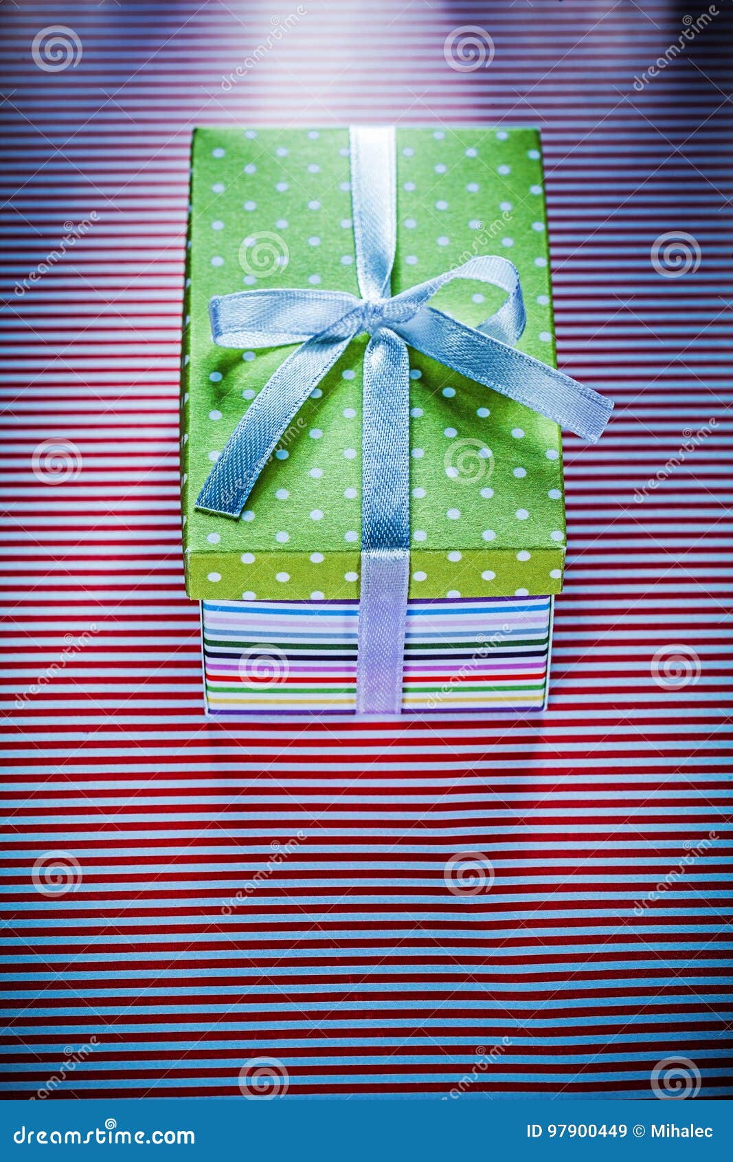 Cardboard Box with Present on Red Striped Fabric Celebrations Co Stock ...
