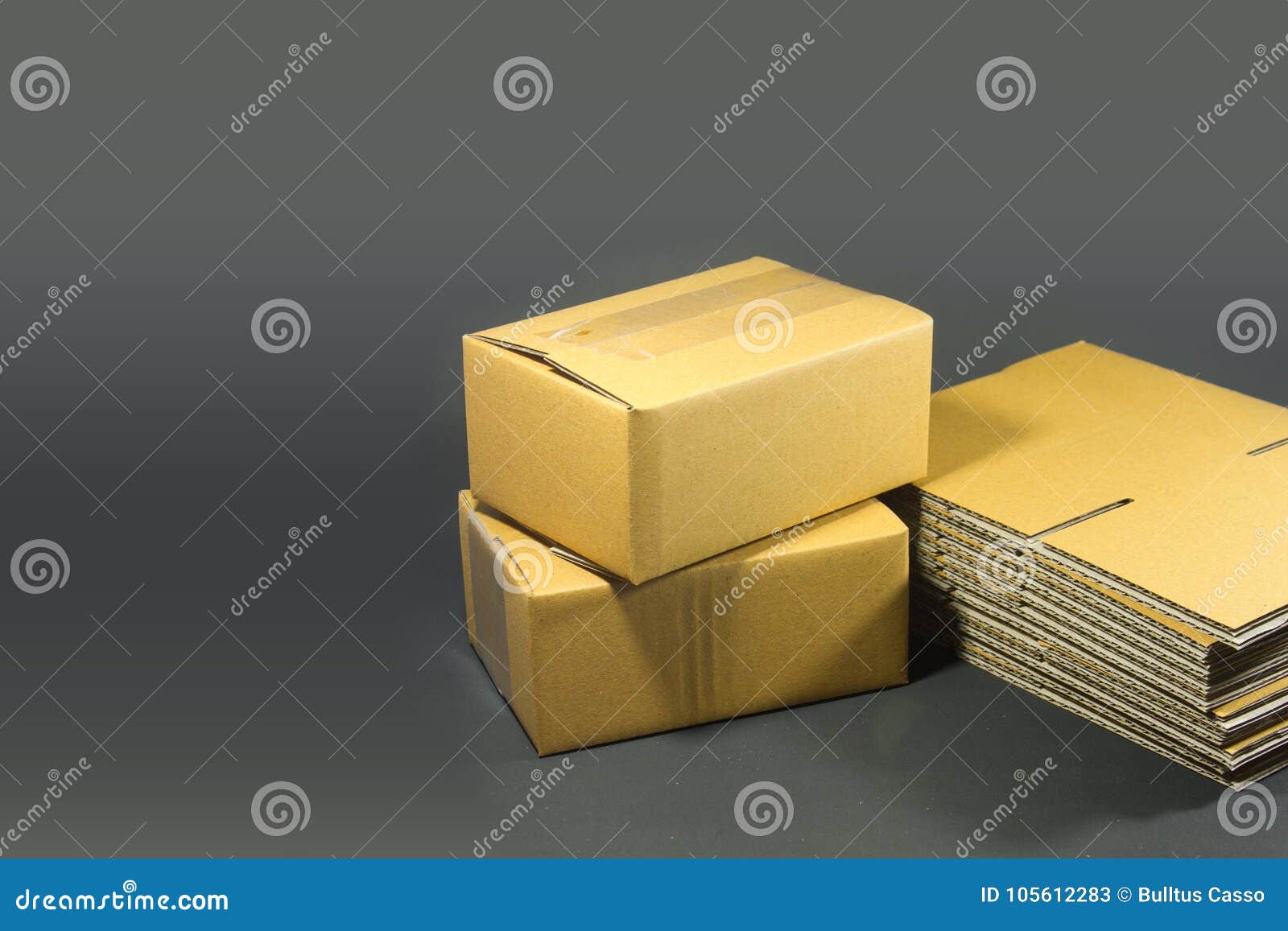 Cardboard Box Stack Isolated on Black Stock Image - Image of black ...