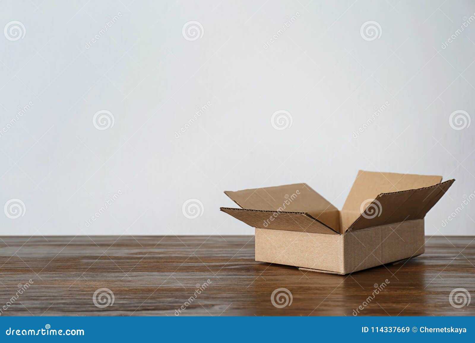Cardboard box on table stock image. Image of moving - 114337669