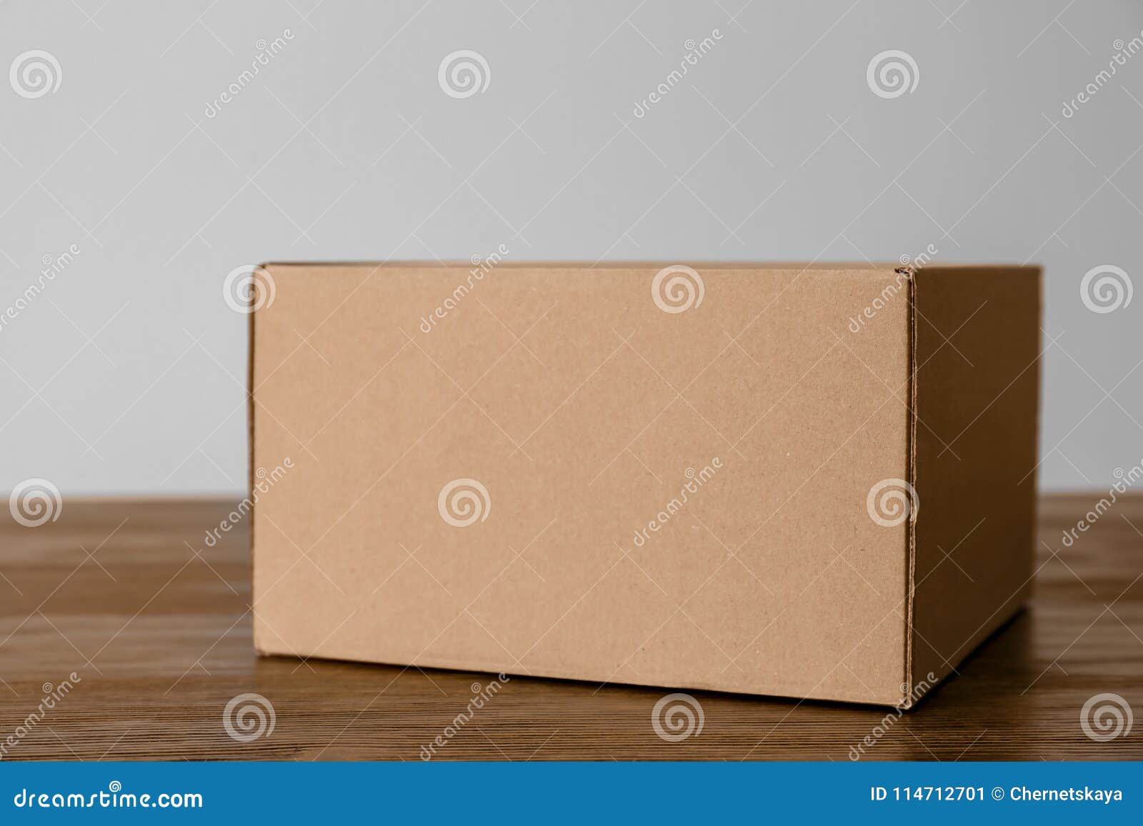 Cardboard box on table stock image. Image of recycle - 114712701