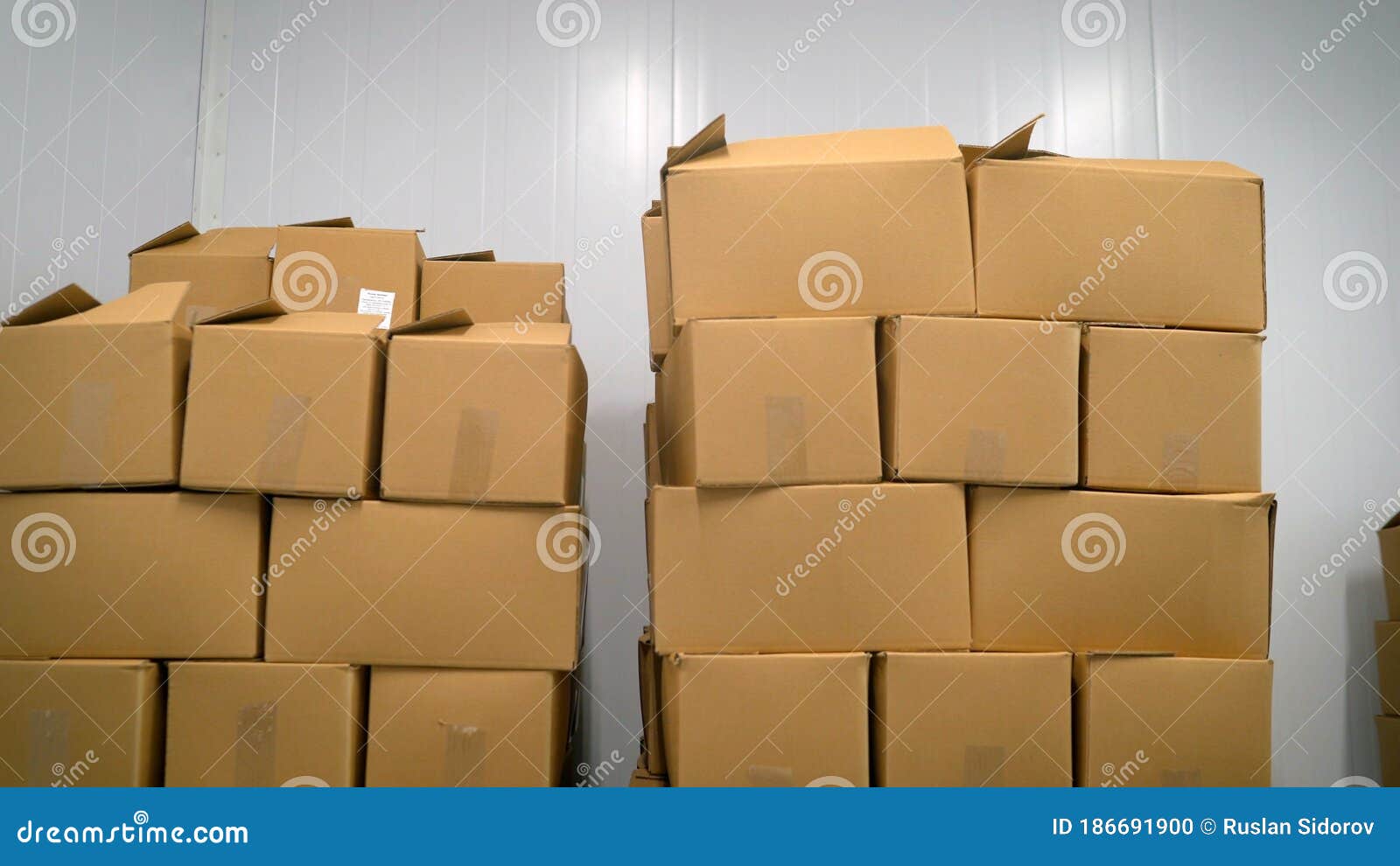 Cardboard Boxes are Accepted for Production. Boxes Driven on a Loader ...