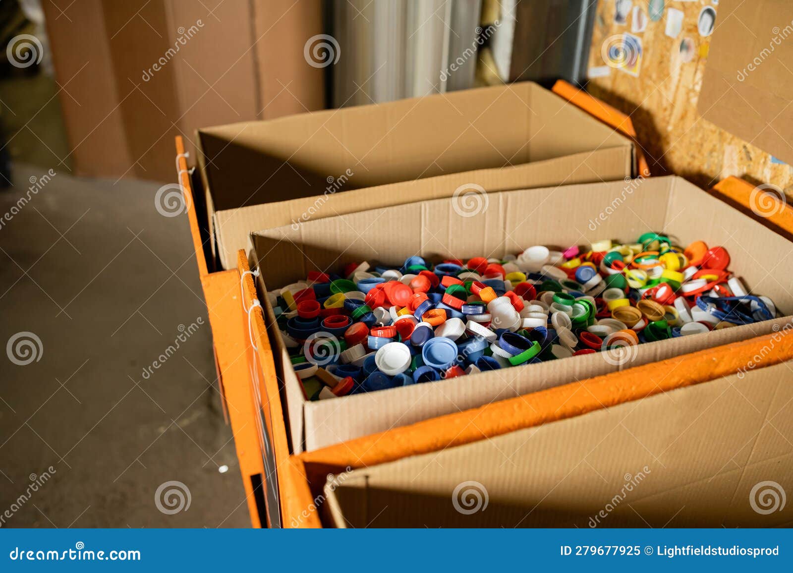 Cardboard Boxes with Colorful Plastic Caps Stock Image - Image of ...