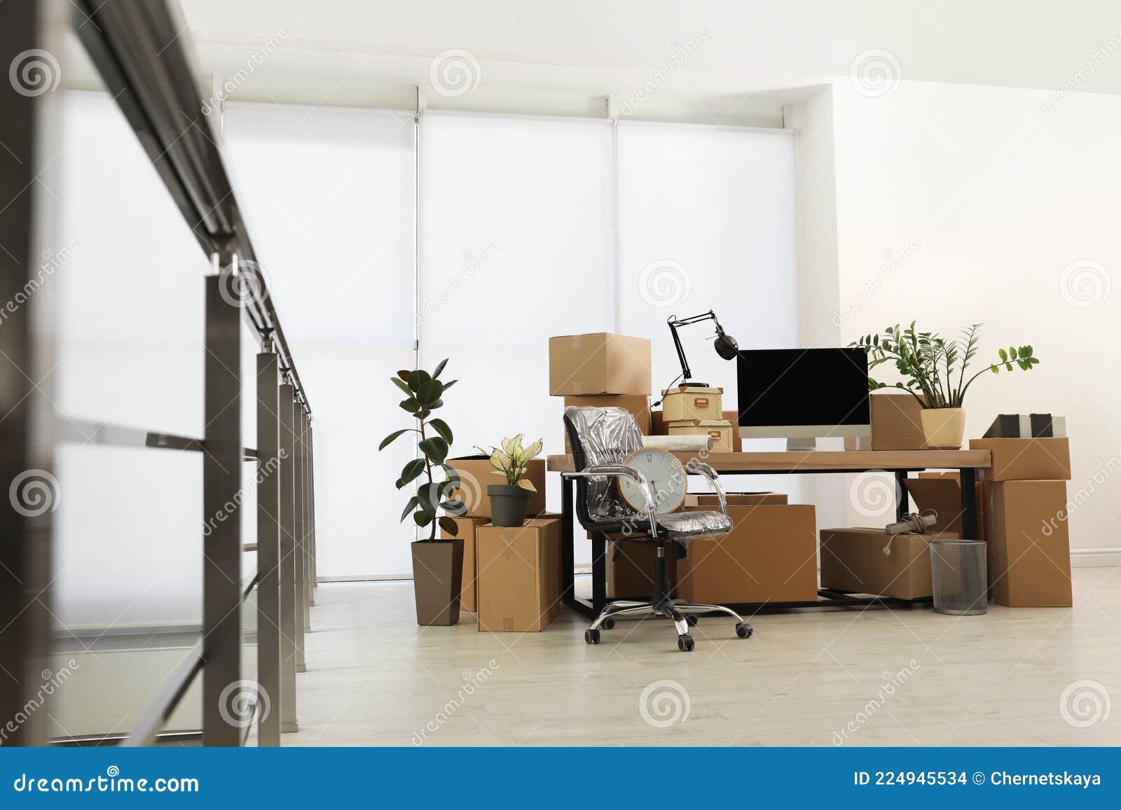 Cardboard Boxes, Computer and Furniture in New Office. Moving Day Stock ...