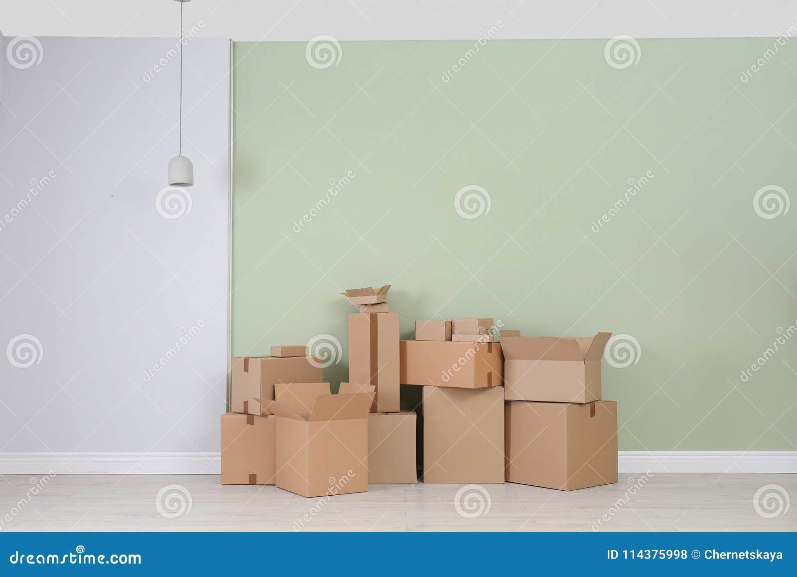 Cardboard boxes on floor stock photo. Image of parcel - 114375998