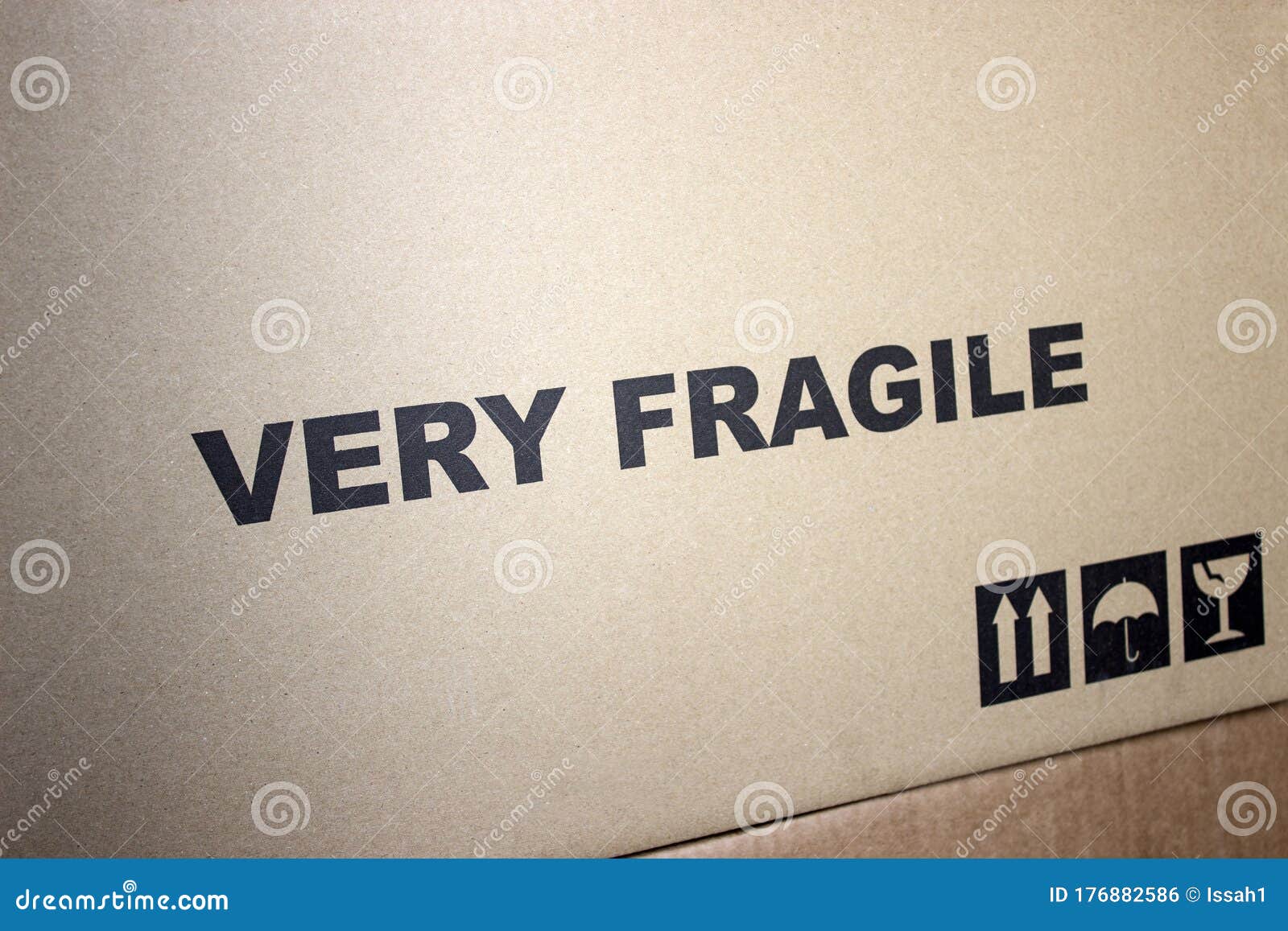 Cardboard Boxes Labeled Very Fragile. Important Information. Text in ...