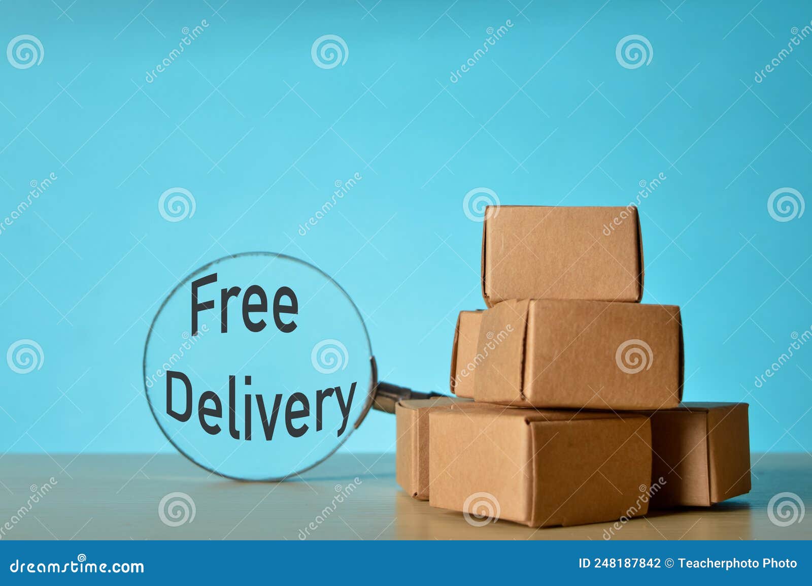Cardboard Boxes and Magnifying Glass with Text FREE DELIVERY Stock ...