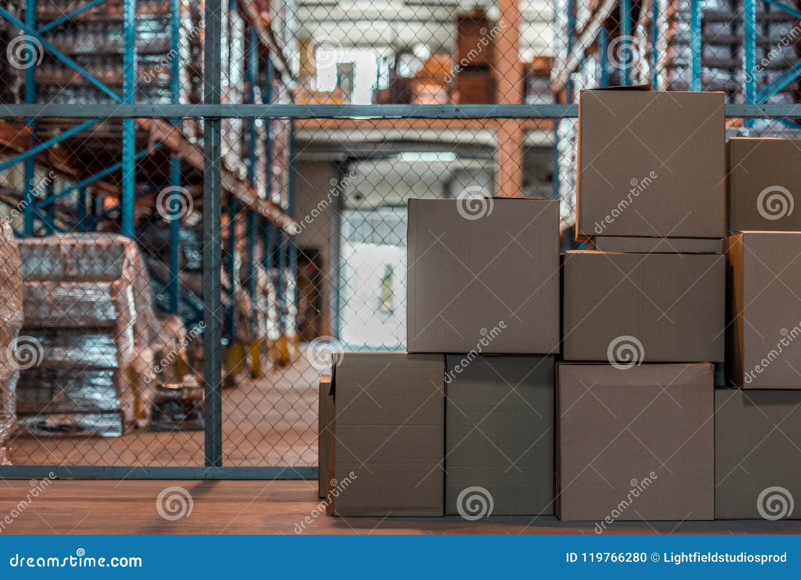 Cardboard Boxes in Modern Storehouse Stock Photo - Image of storehouse ...