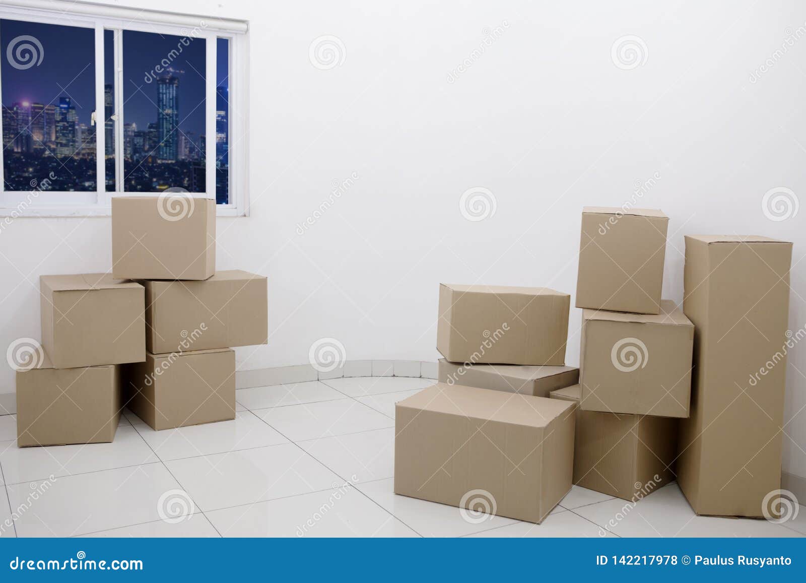 Cardboard Boxes in a New Apartment Stock Photo - Image of movement ...
