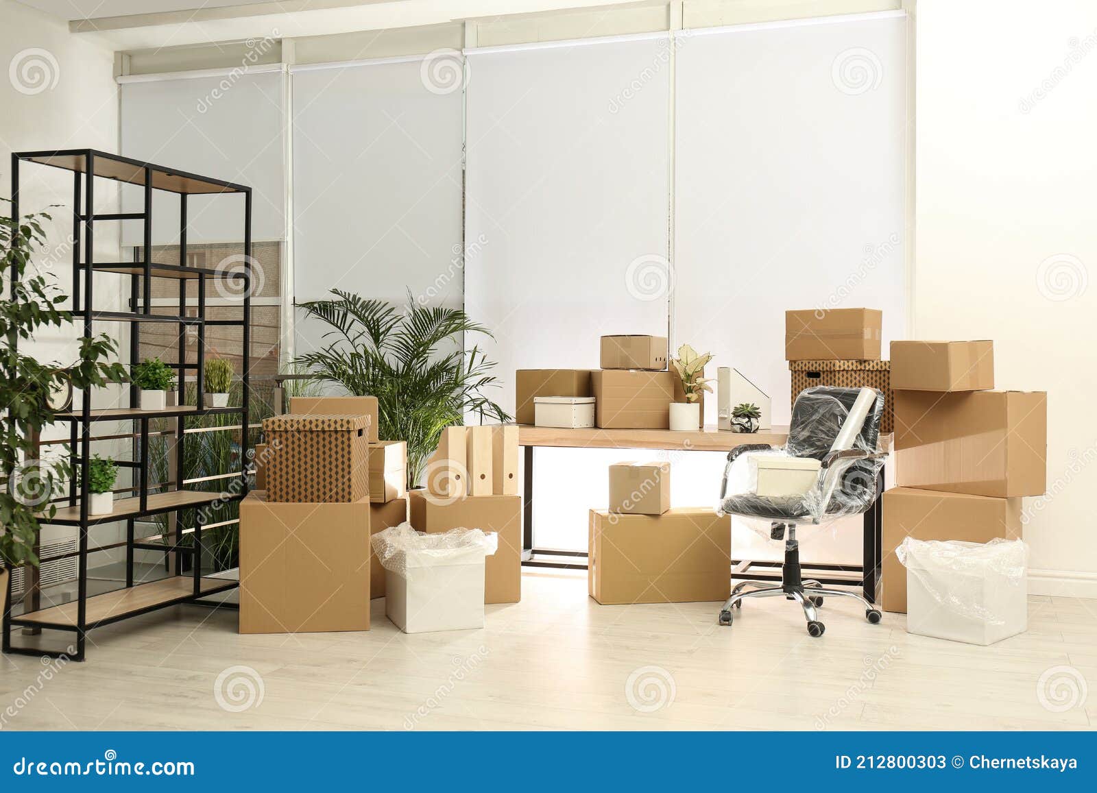 Cardboard Boxes and Packed Chair in Office. Moving Day Stock Image ...