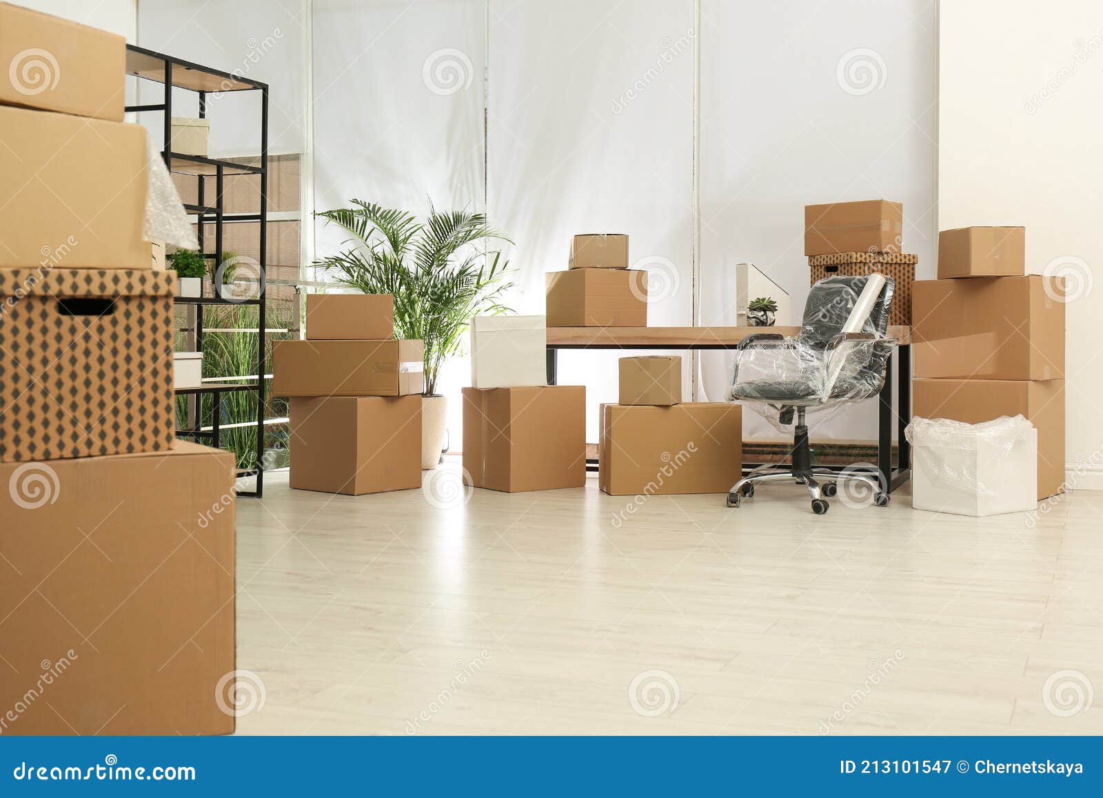 Cardboard Boxes and Packed Chair in Office. Moving Day Stock Image ...