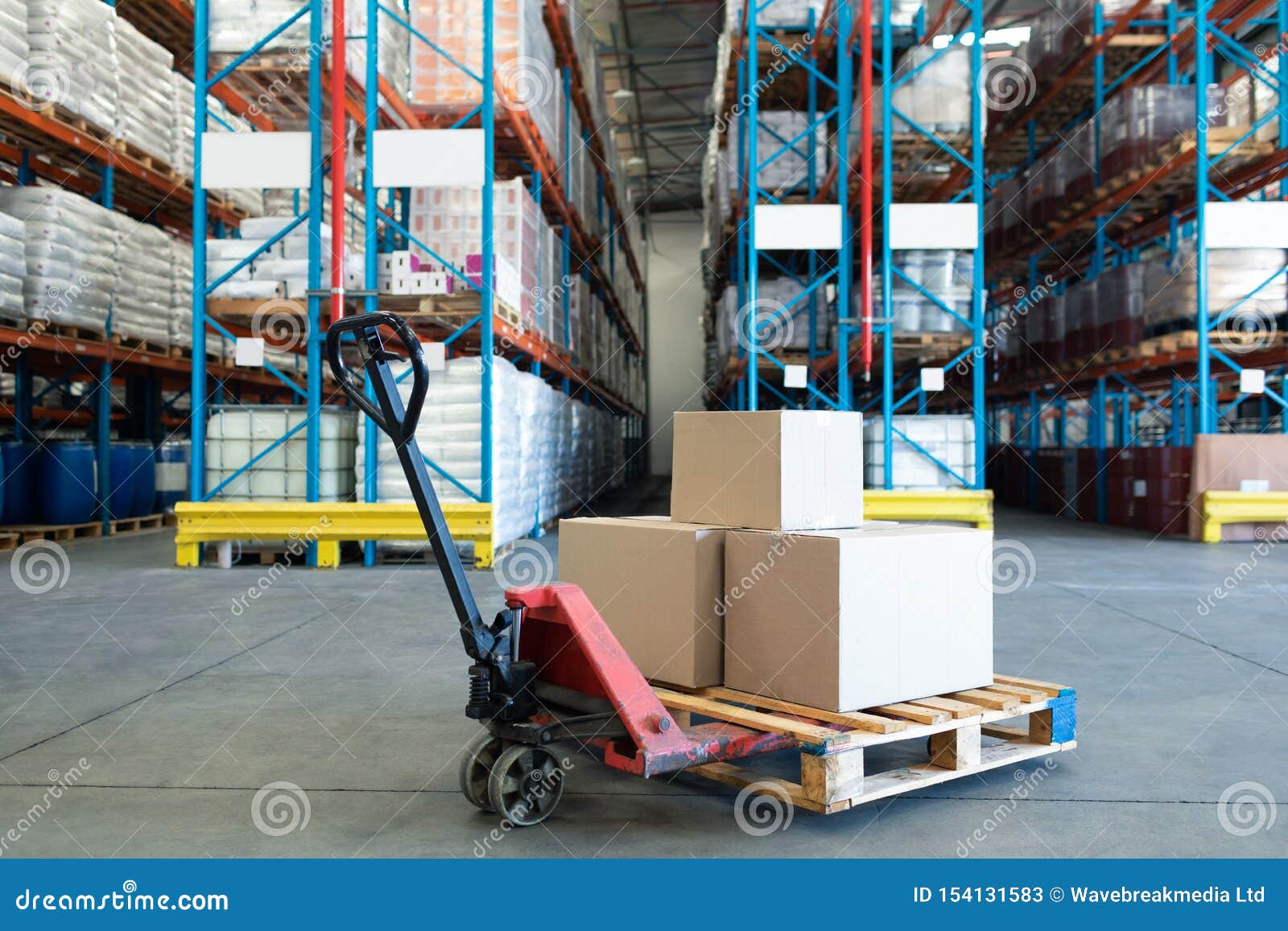 Cardboard Boxes on a Pallet Jack in Warehouse Stock Image - Image of ...