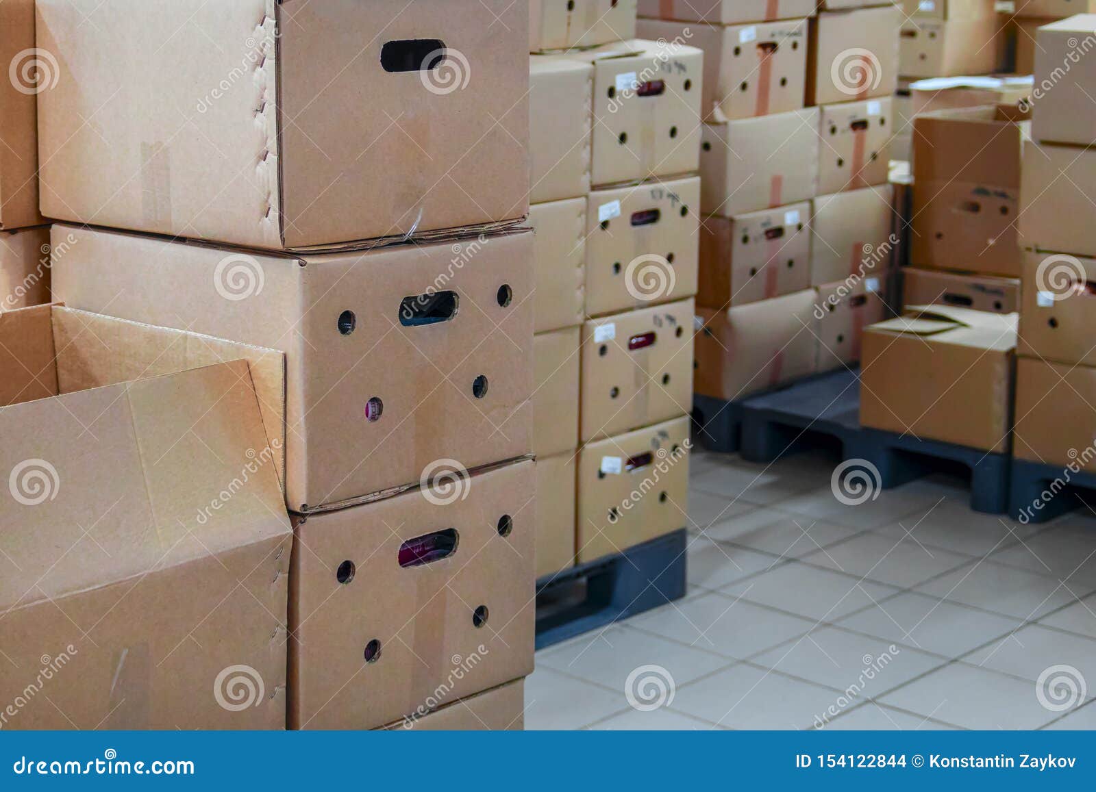 Cardboard Boxes in Stacks in Storage Facility Stock Photo - Image of ...