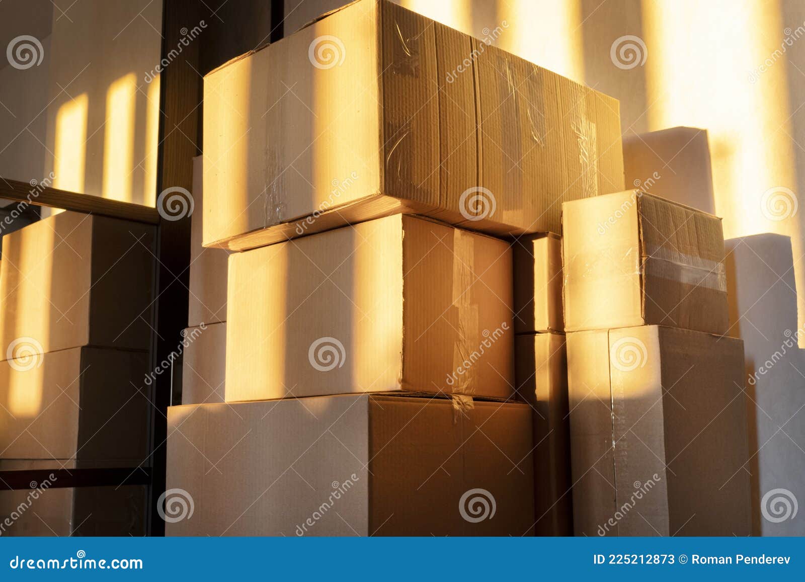 Cardboard boxes in the sun stock image. Image of indoor - 225212873