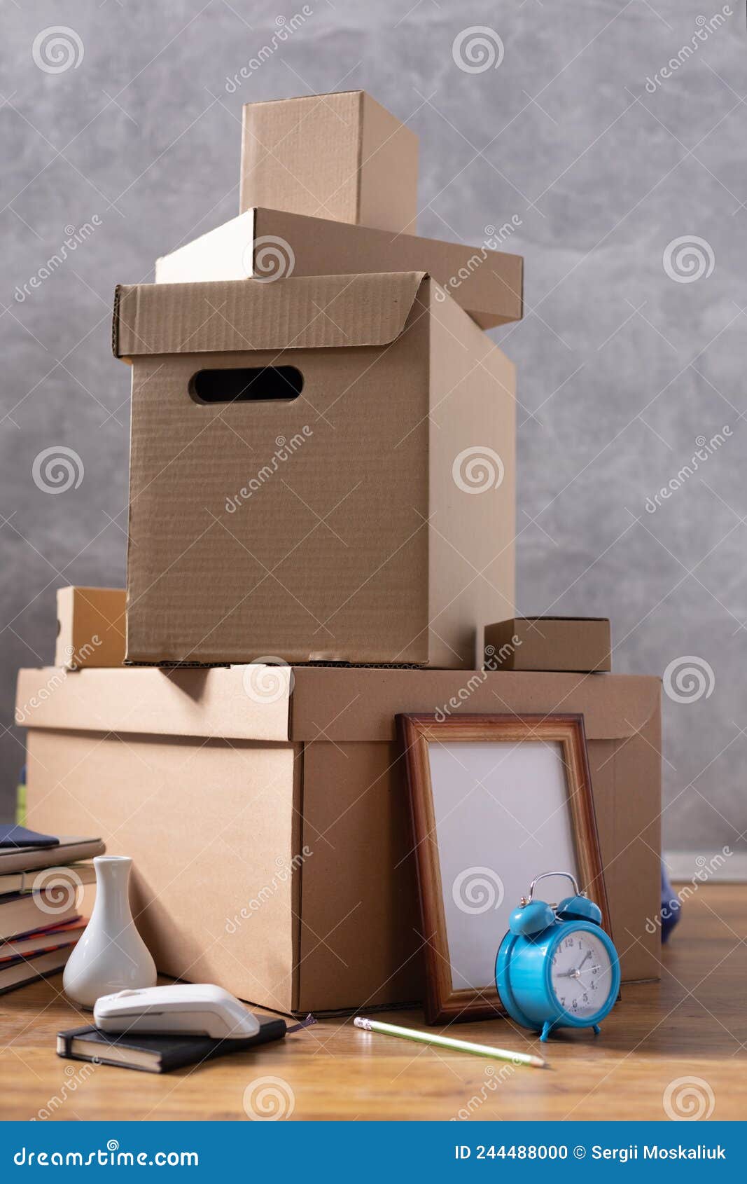 Cardboard Boxes and Things for Moving To New Home. Stack of Cardboard ...