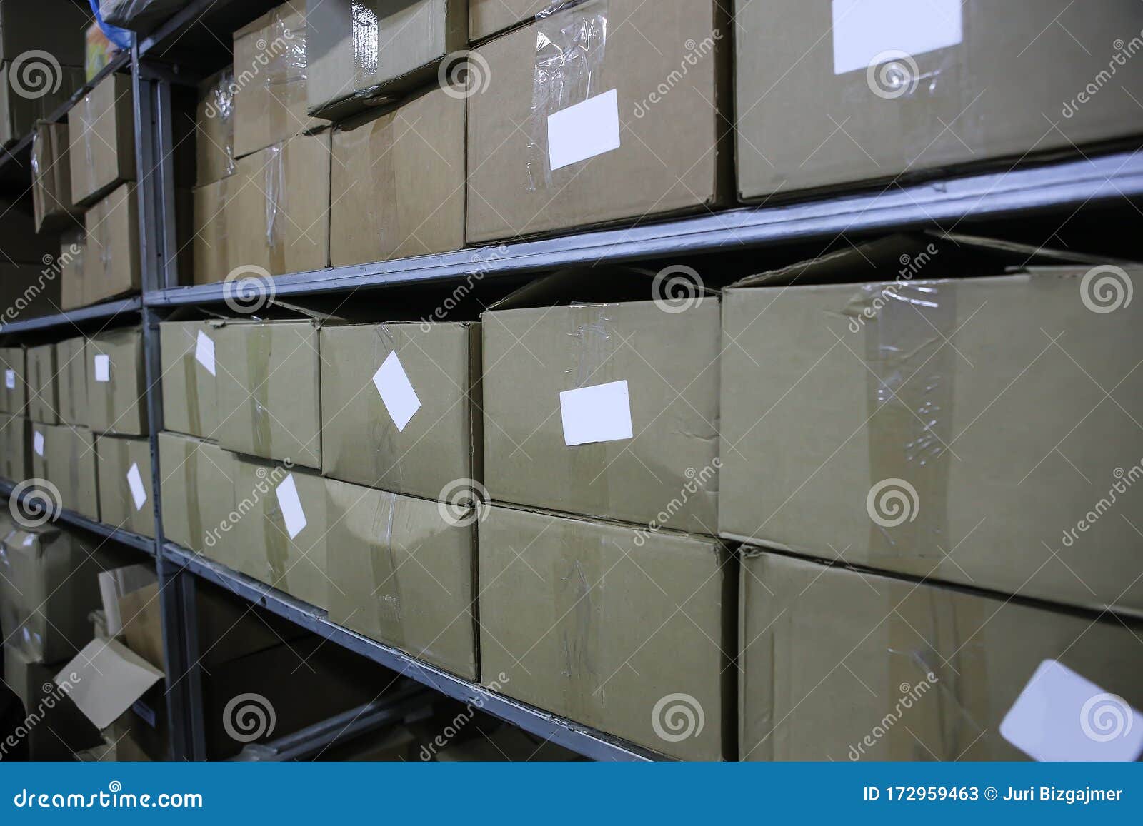 Cardboard Boxes on Warehouse Shelves Stock Image - Image of inventory ...