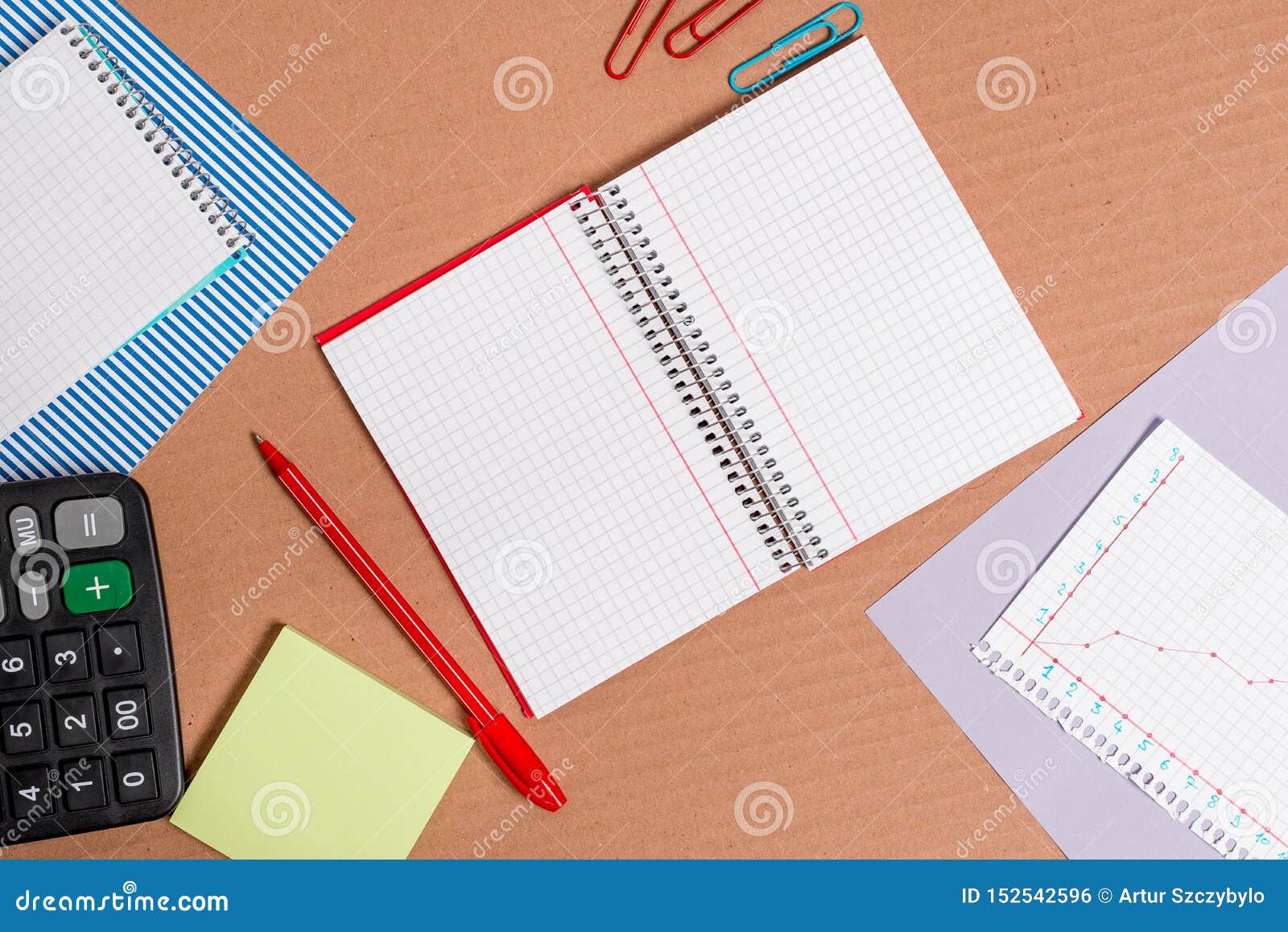 Cardboard Desk with a Striped Blue Sheet, Notebook Paper and Office ...