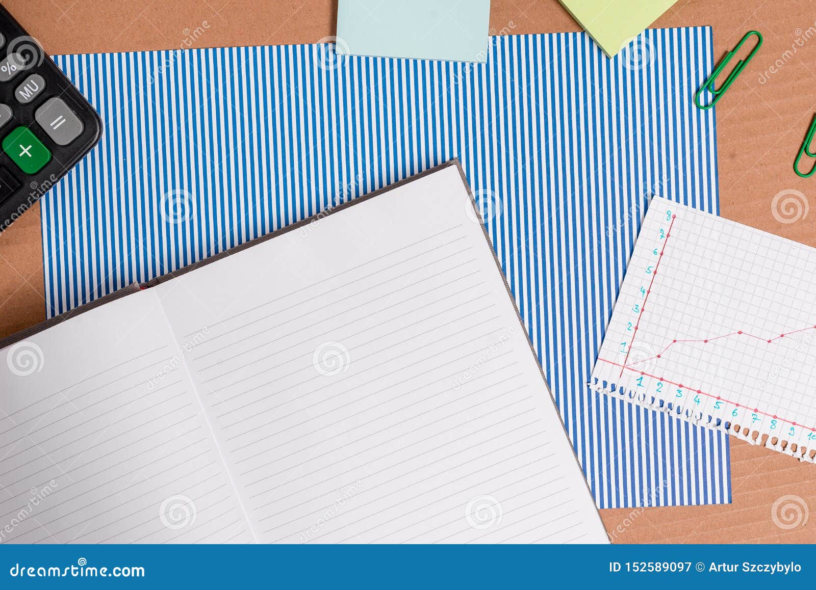 Cardboard Desk with a Striped Blue Sheet, Notebook Paper and Office ...