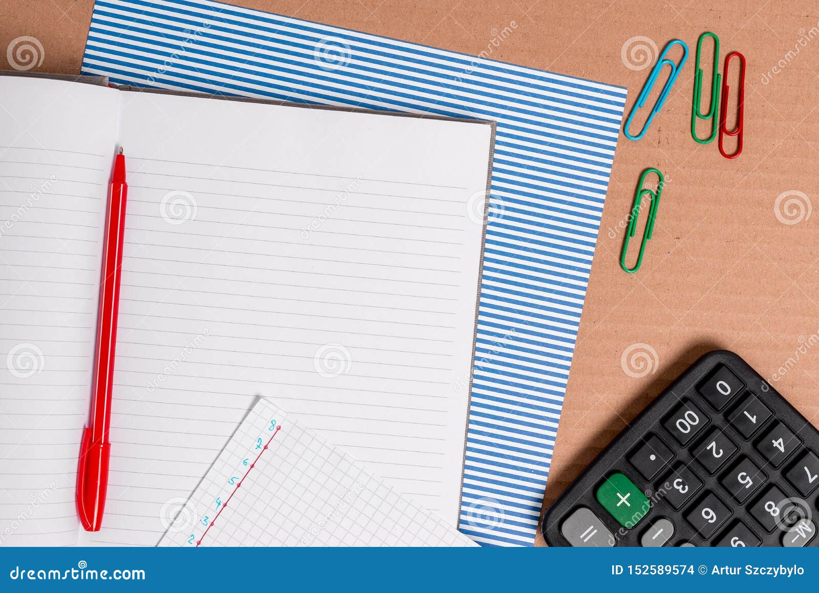Cardboard Desk with a Striped Blue Sheet, Notebook Paper and Office ...