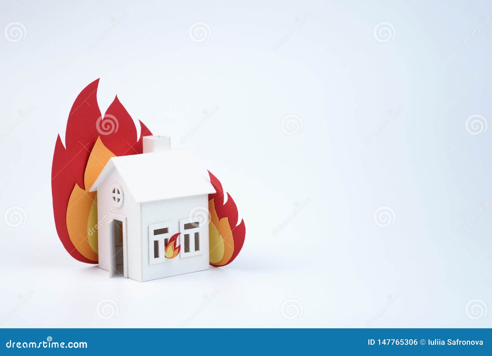 Cardboard House Lit with Paper Fire, Concept, Daylight Hours Stock ...