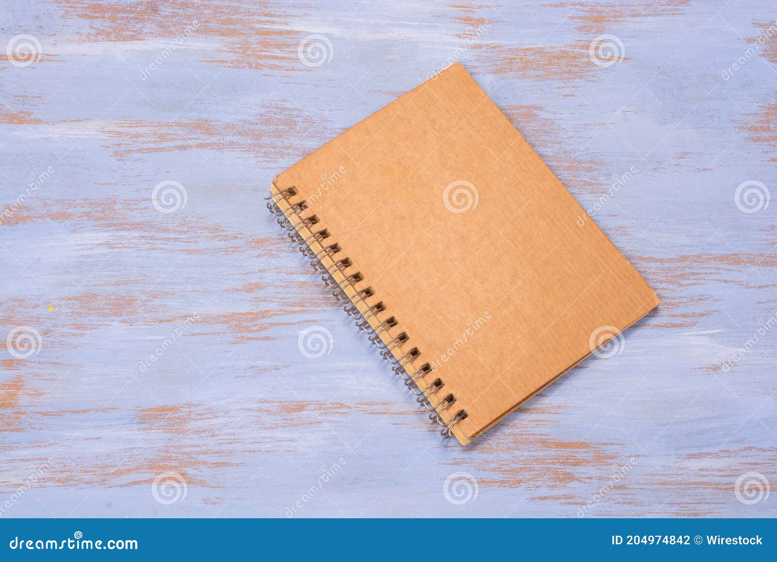 Cardboard Notebook Cover on a Blue Wooden Surface Stock Photo - Image ...
