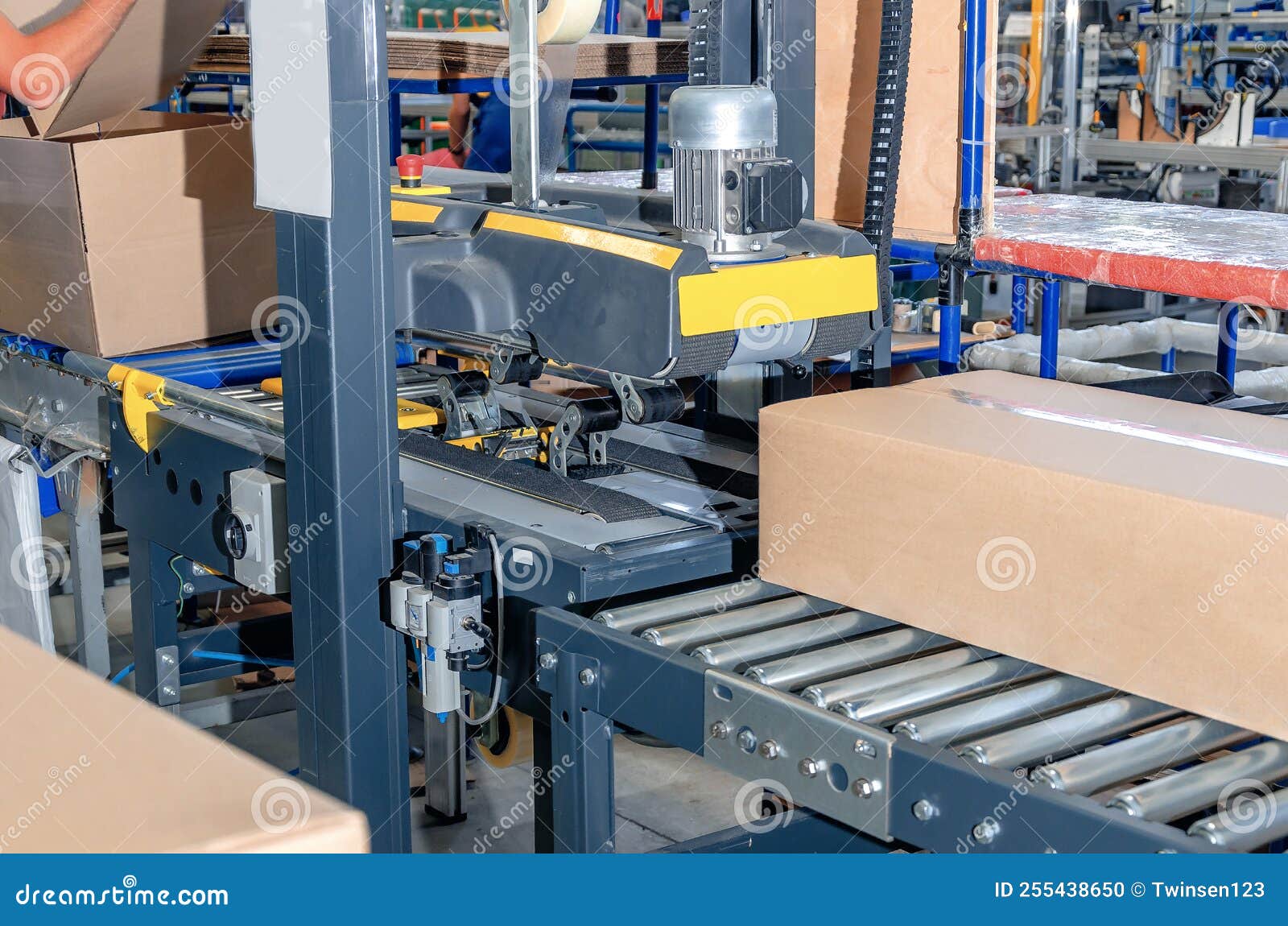 Cardboard Packaging Machine. Production Line of Packaging Stock Photo ...