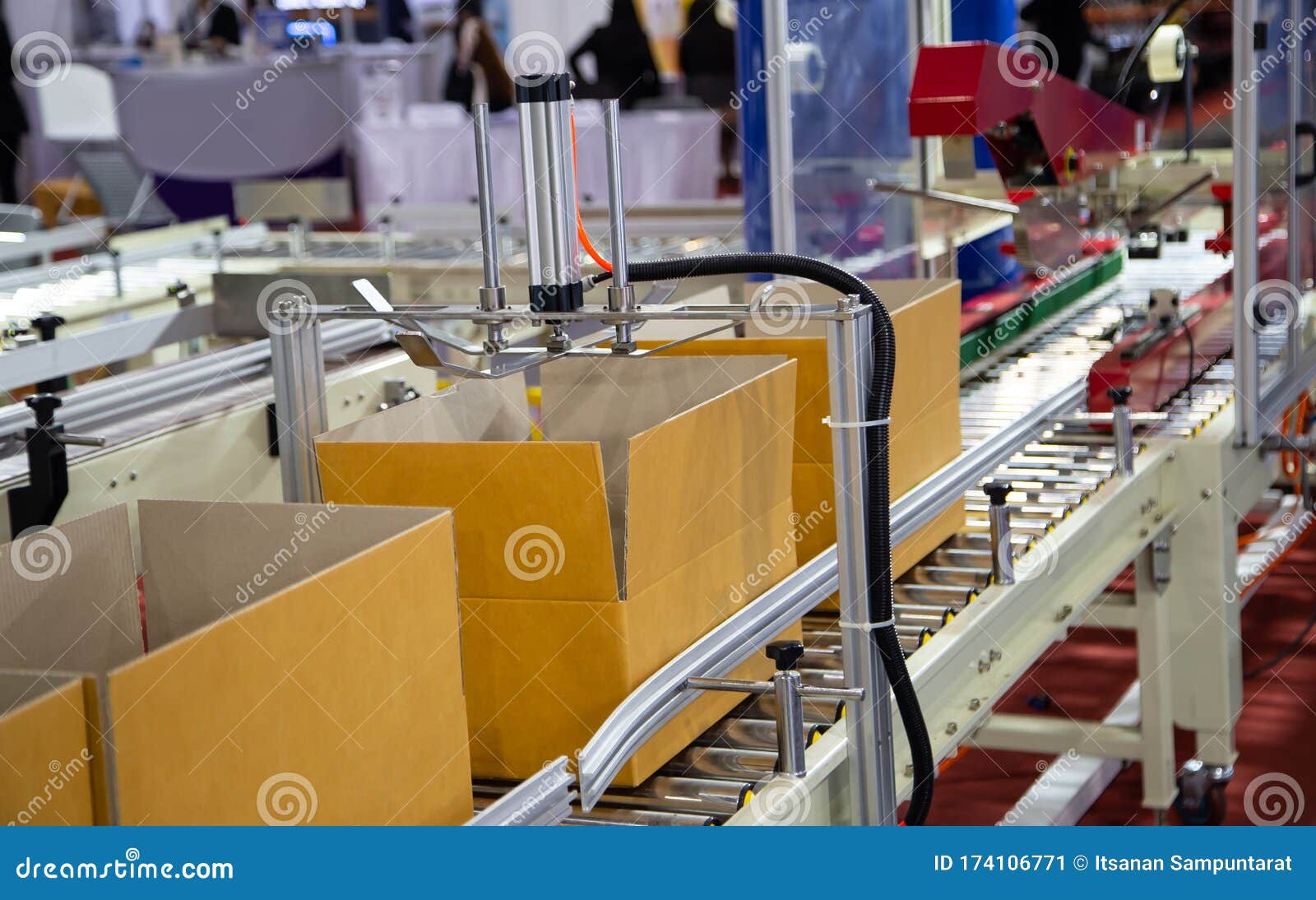 Cardboard Packing and Sealing Machine Stock Image - Image of automated ...