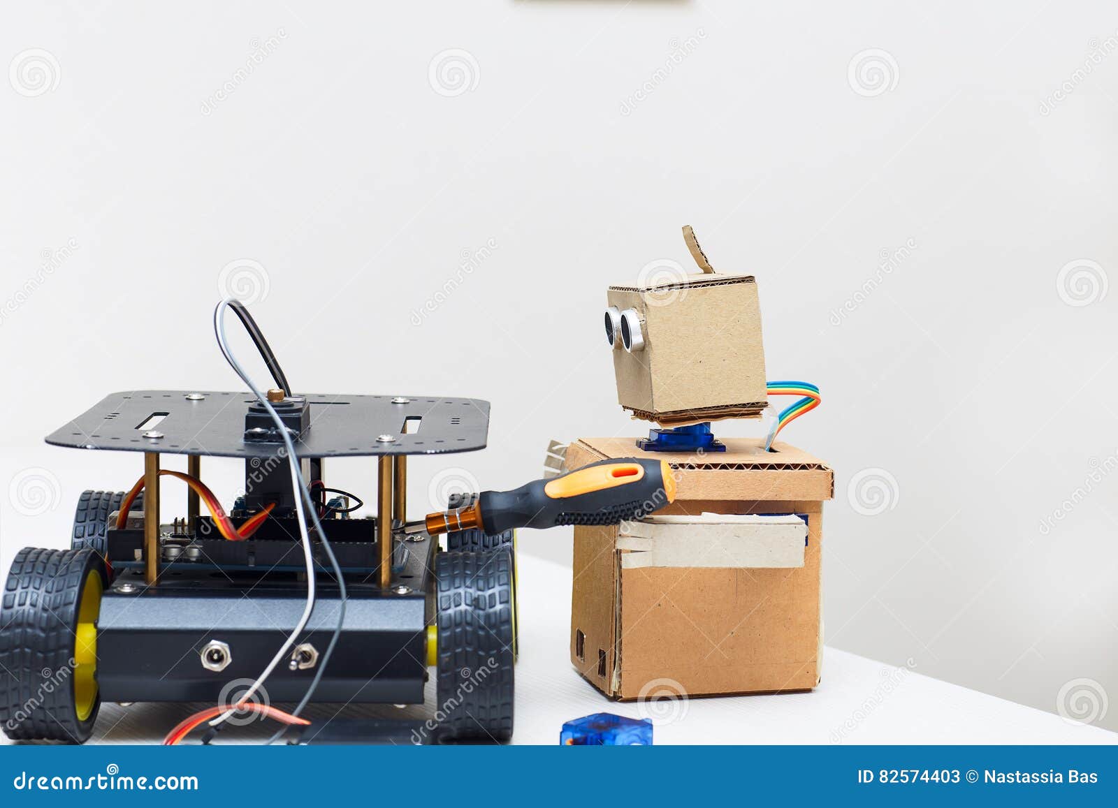Cardboard Robot On A White Background. Artificial Intelligence Stock ...