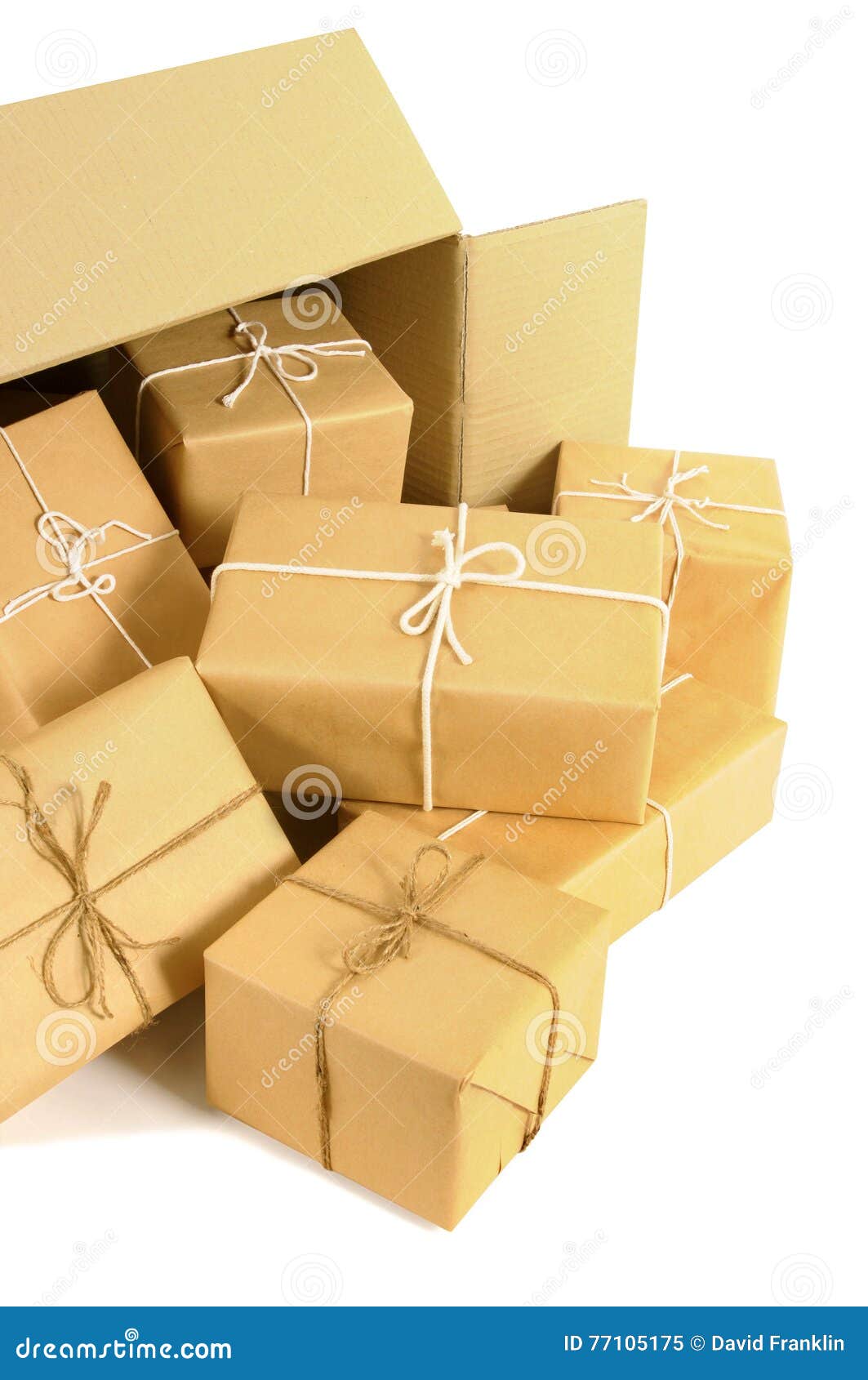 Cardboard Shipping Box with Several Brown Paper Packages Inside Stock ...