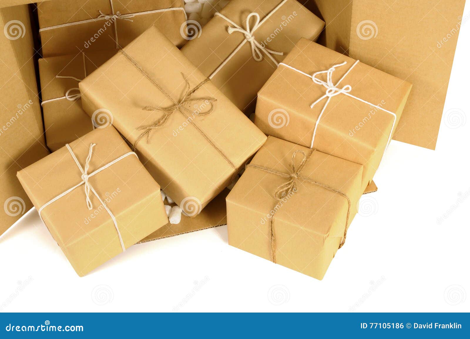 Cardboard Shipping Box with Several Brown Paper Packages or Parcels ...