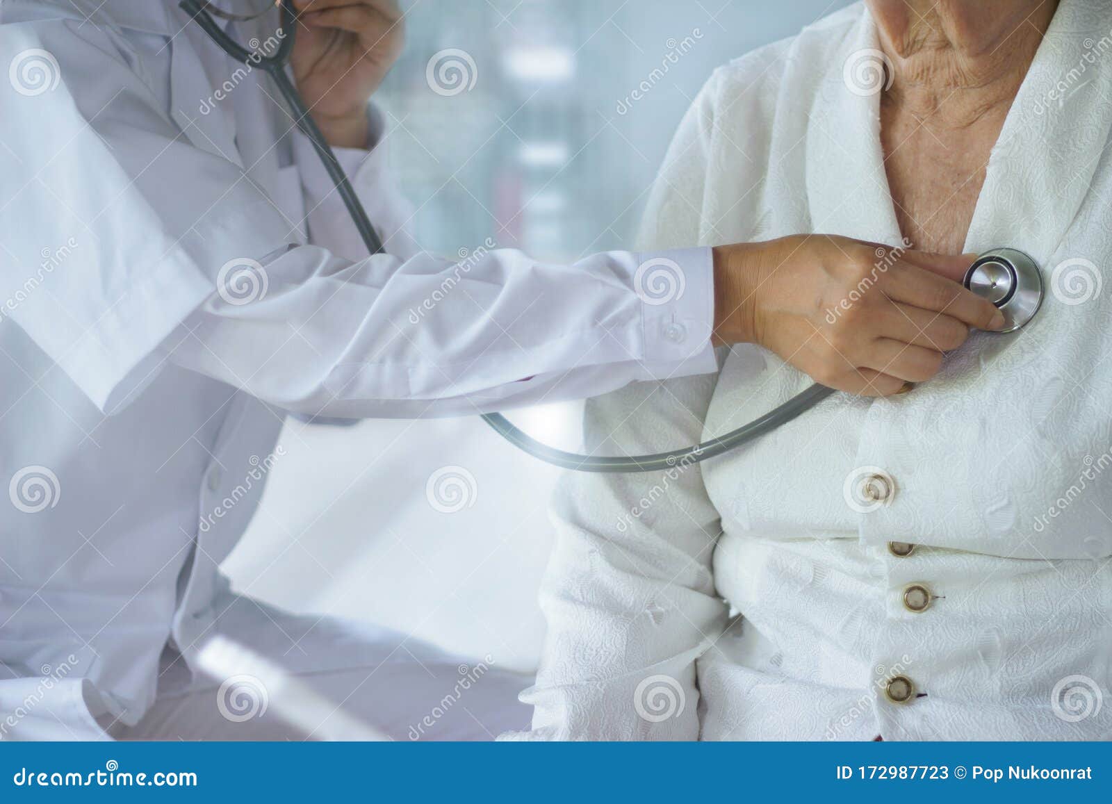 Cardiologist Doctor With Stethoscope Analysis And Checking Elderly