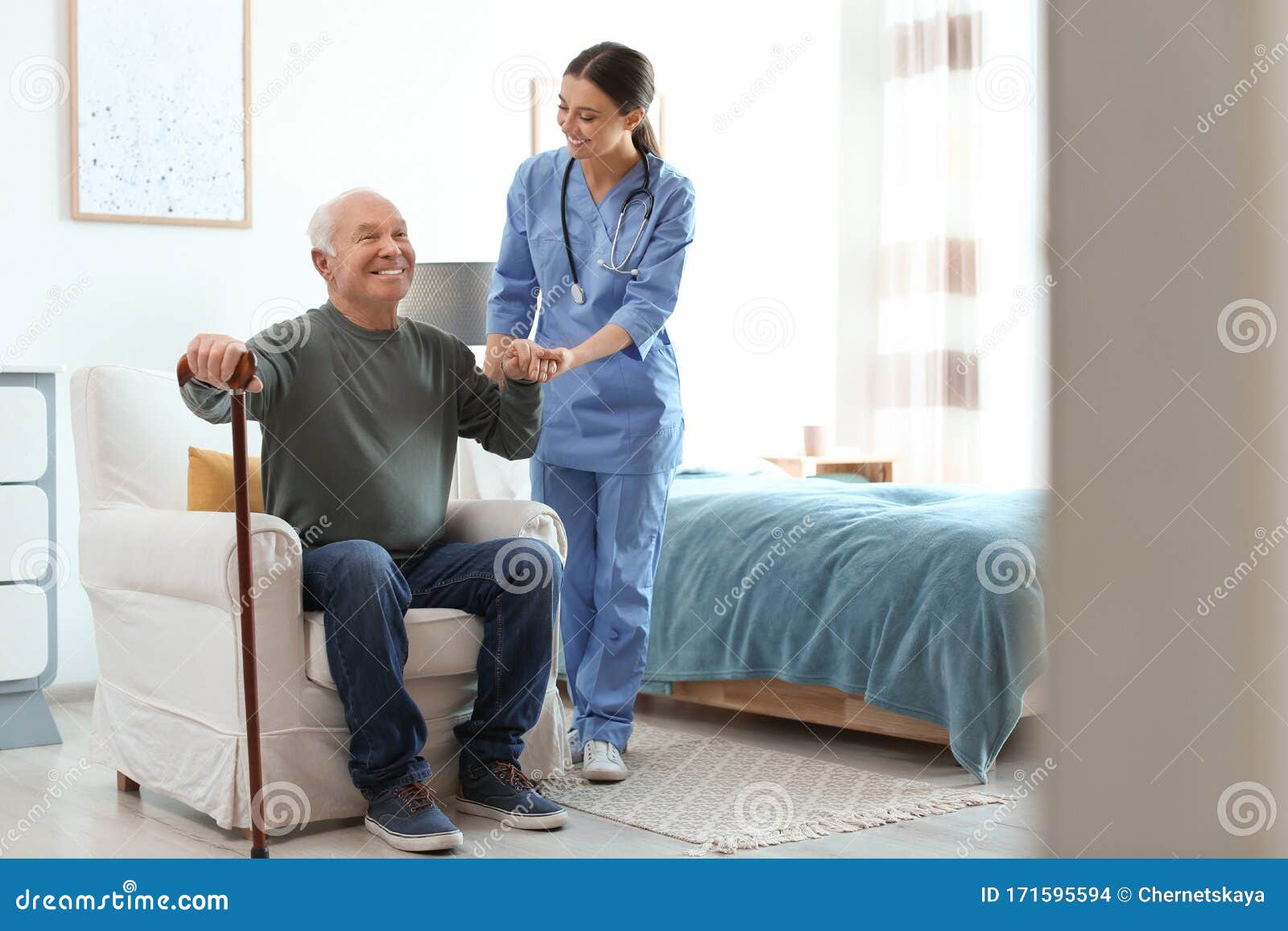 Care Worker Helping Elderly Man with Stick Stock Photo - Image of ...